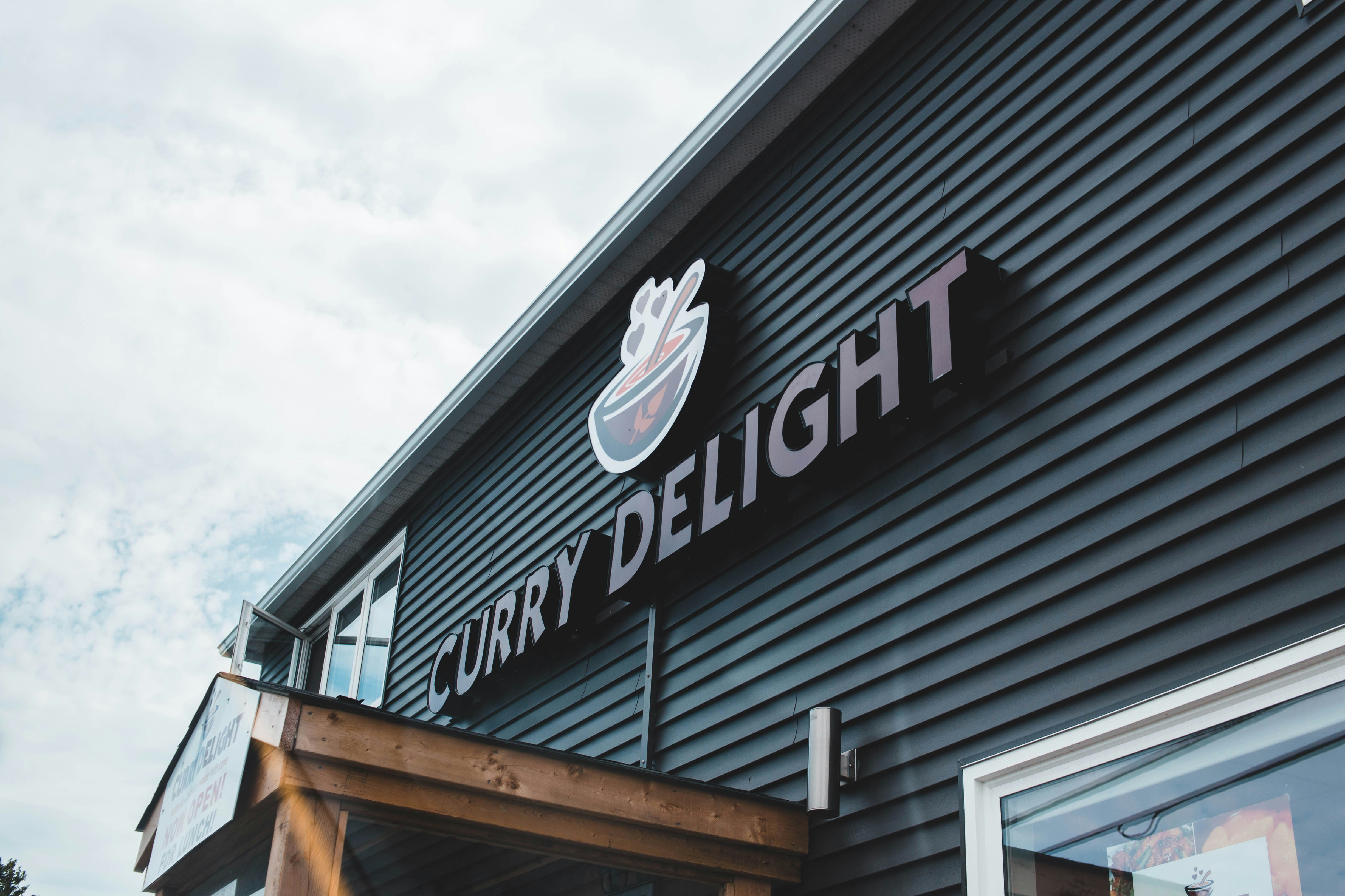 Black Curry Delight signage photo – Free Grey Image on Unsplash