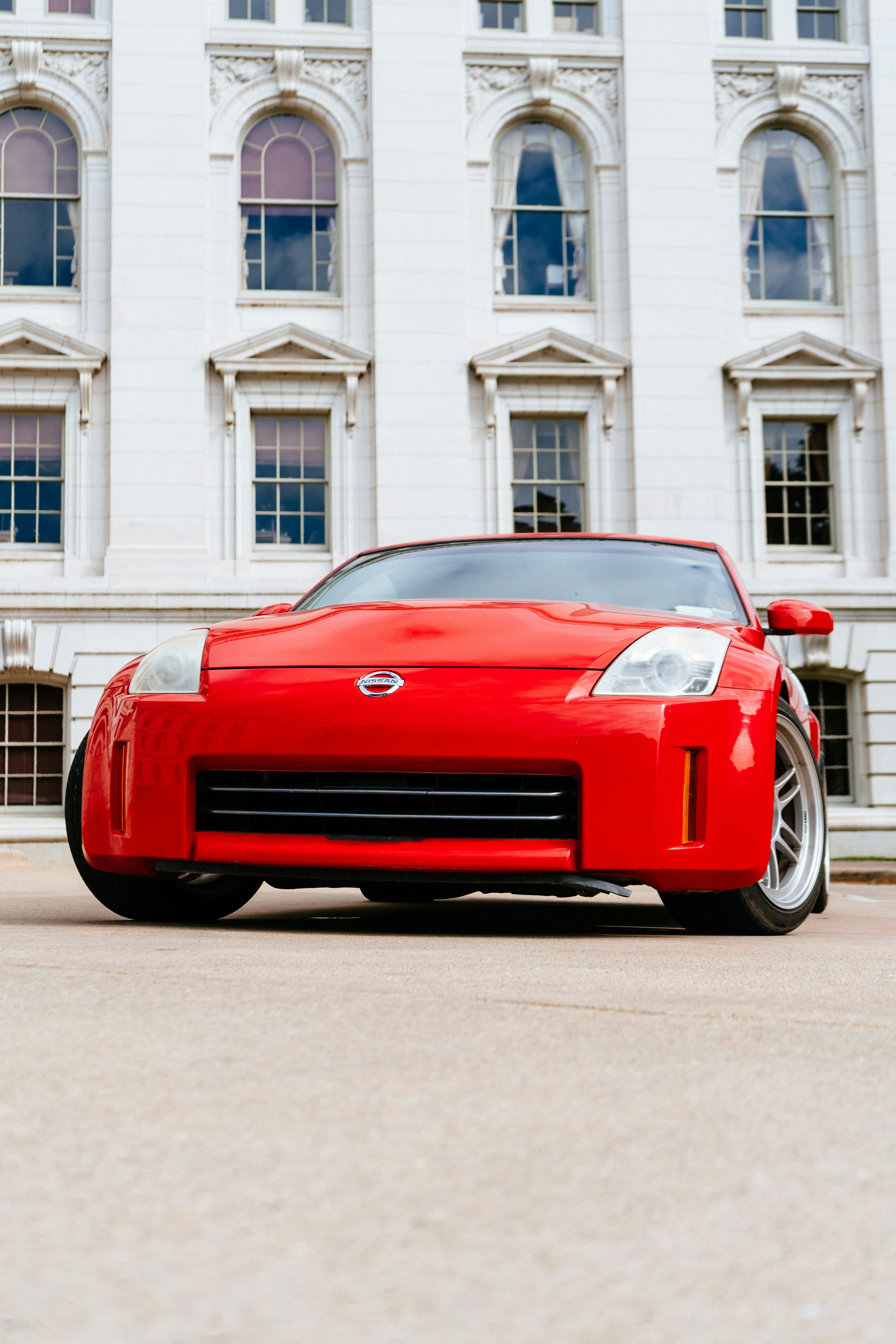 Red Nissan vehicle photo – Free Red Image on Unsplash
