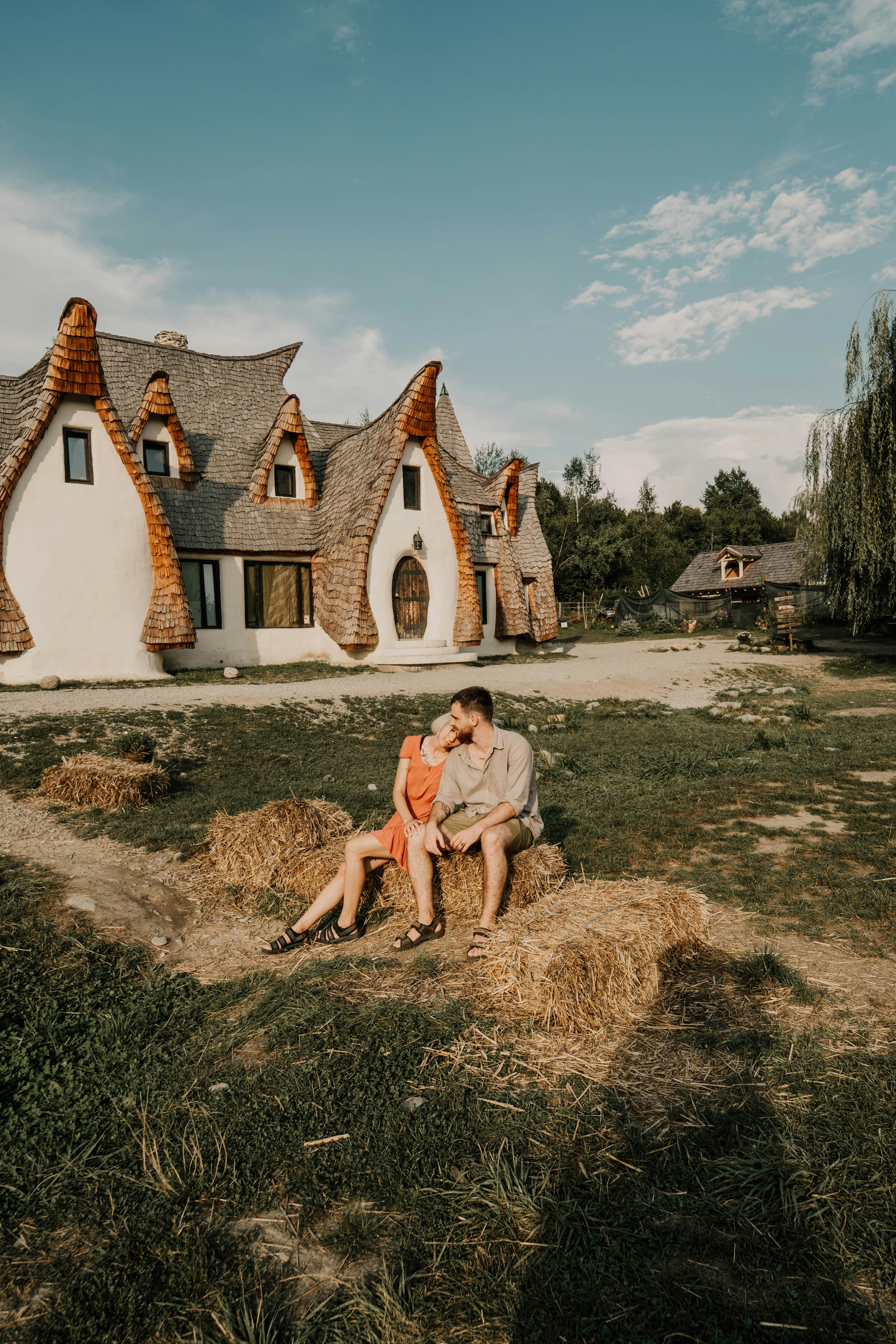 Hayfield Moment: A Quiet Embrace in Rustic Architecture