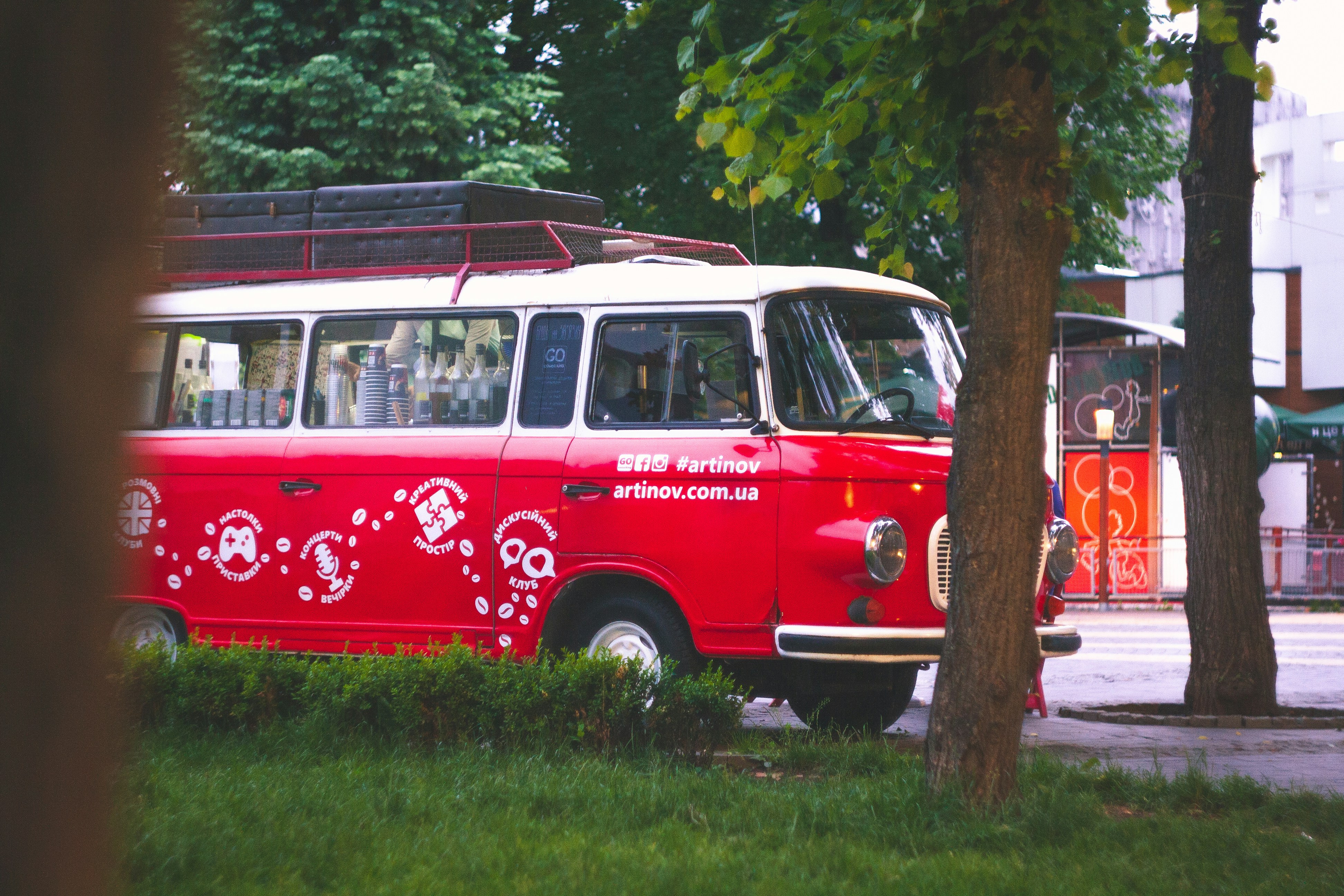 parked red and multicolored van