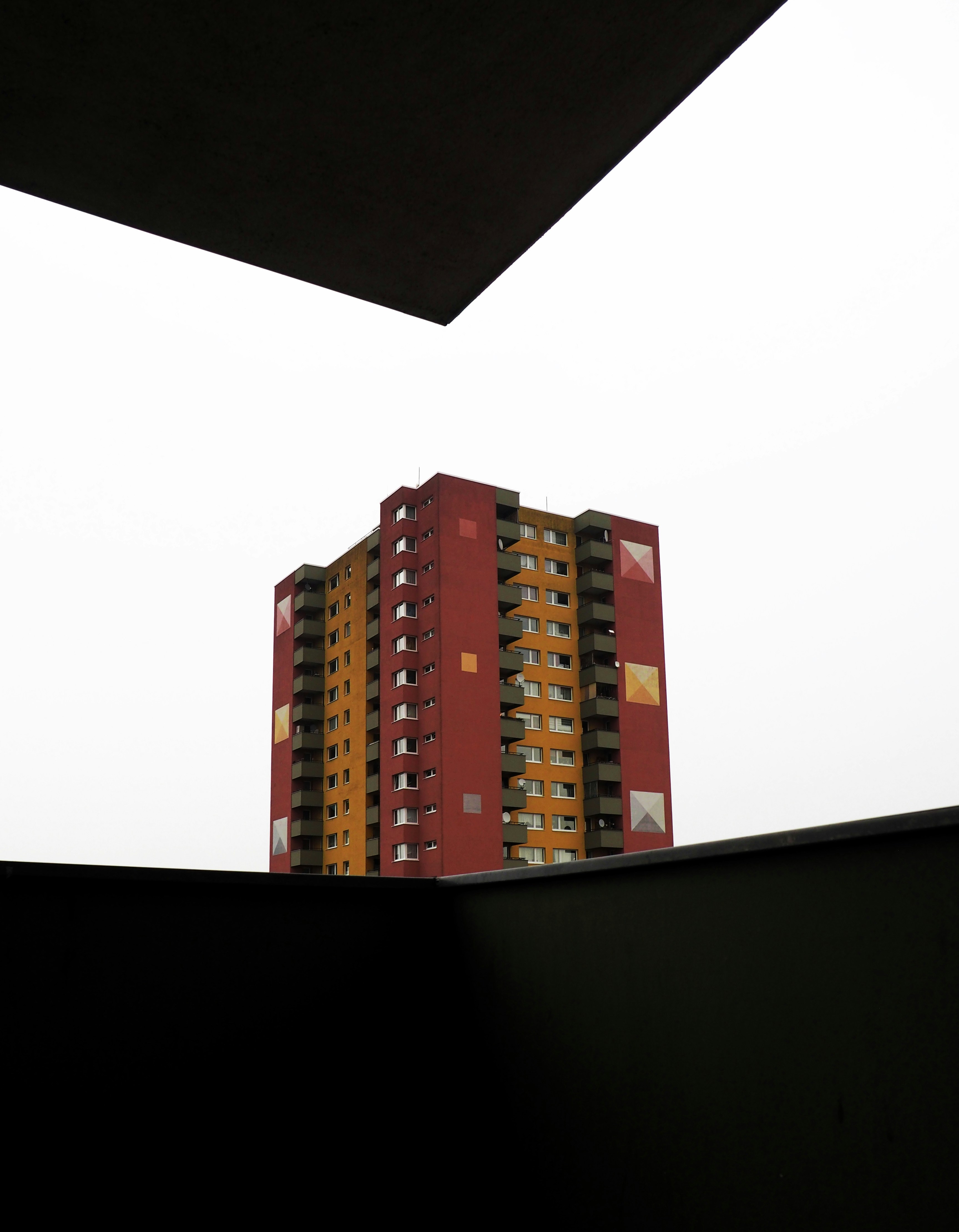 Red high rise building photo – Free City Image on Unsplash