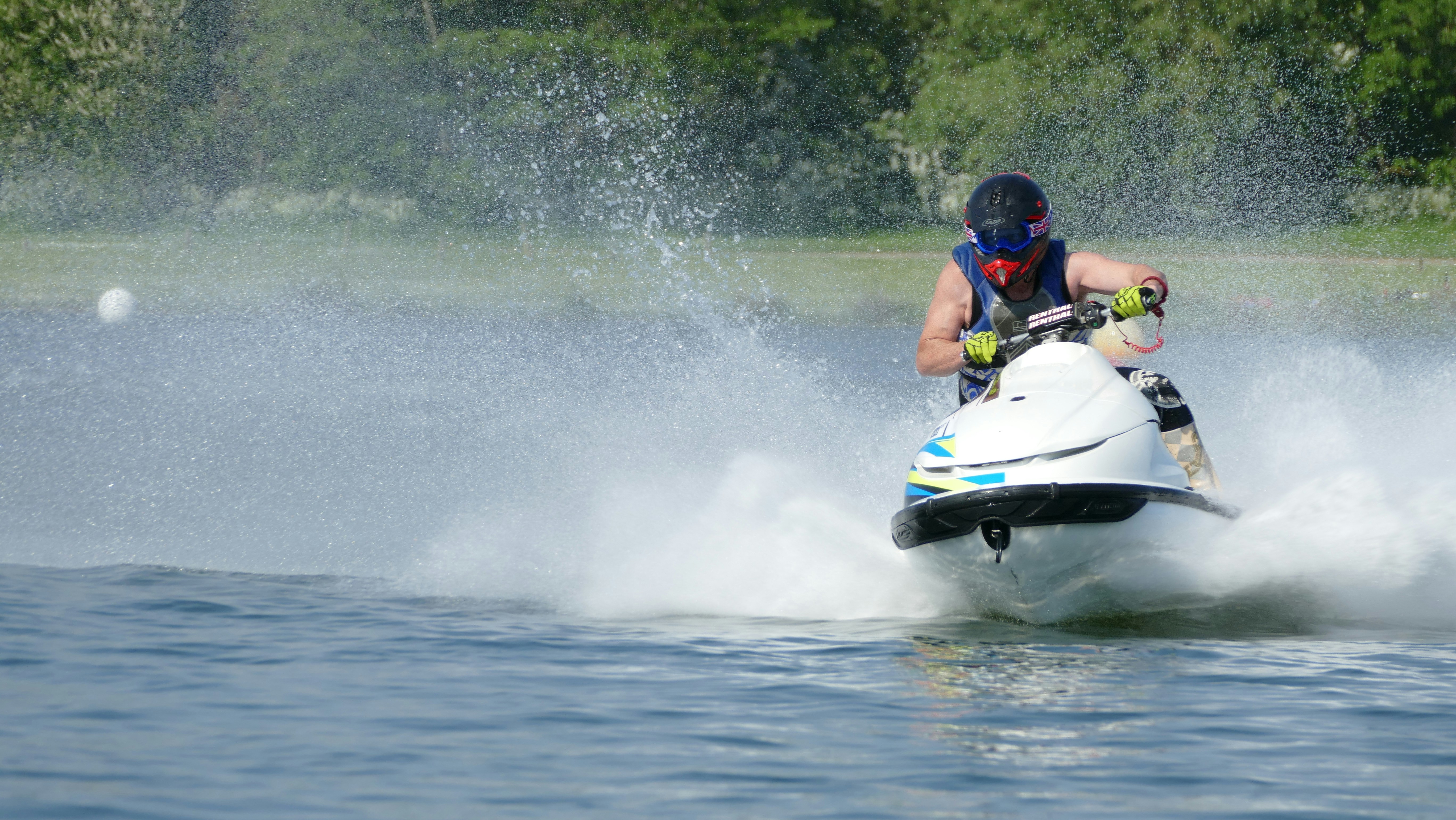 Jet-Spray Pursuit: Rider Races a White Sea-DoJet in a Wake of Foam