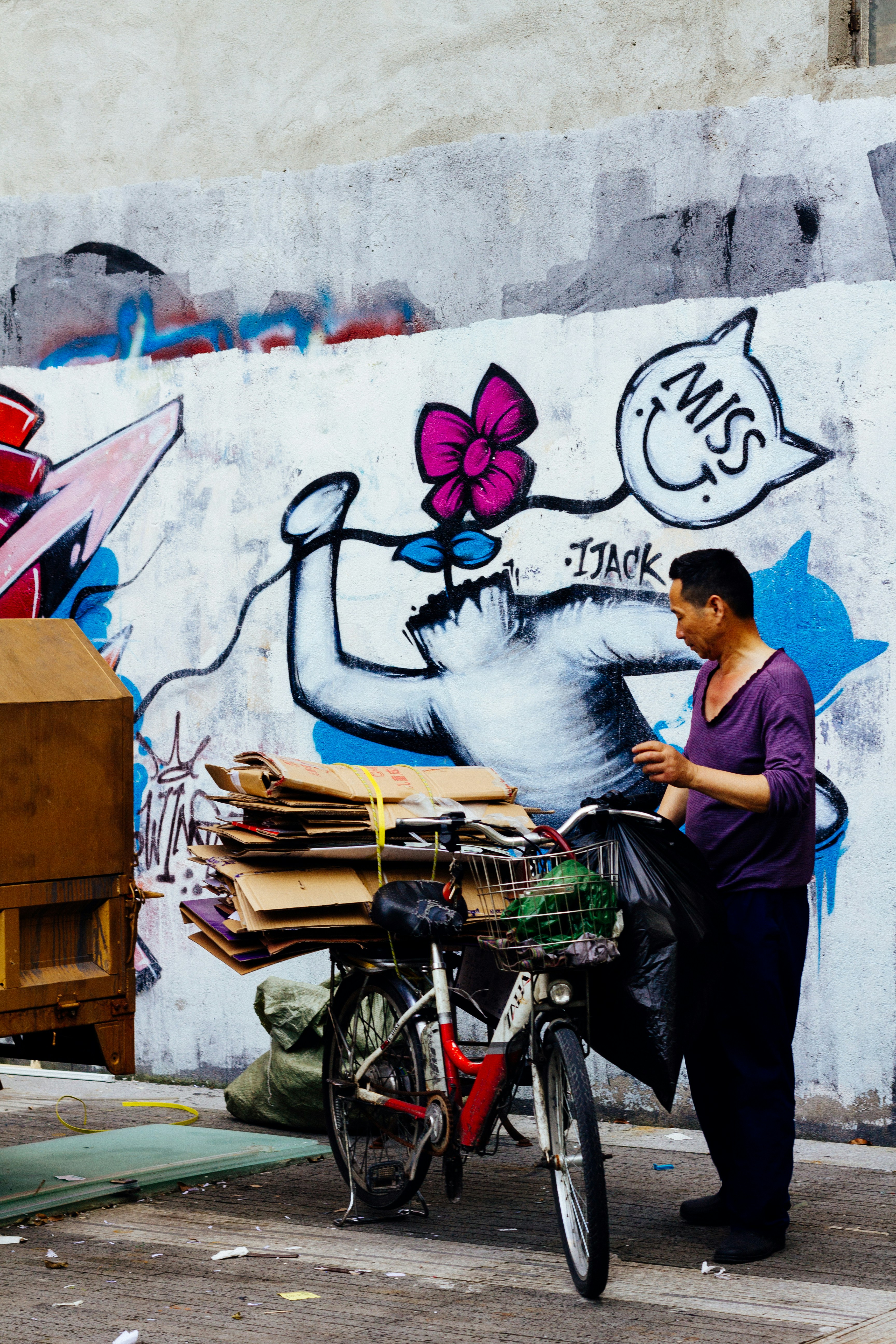 man holding bik