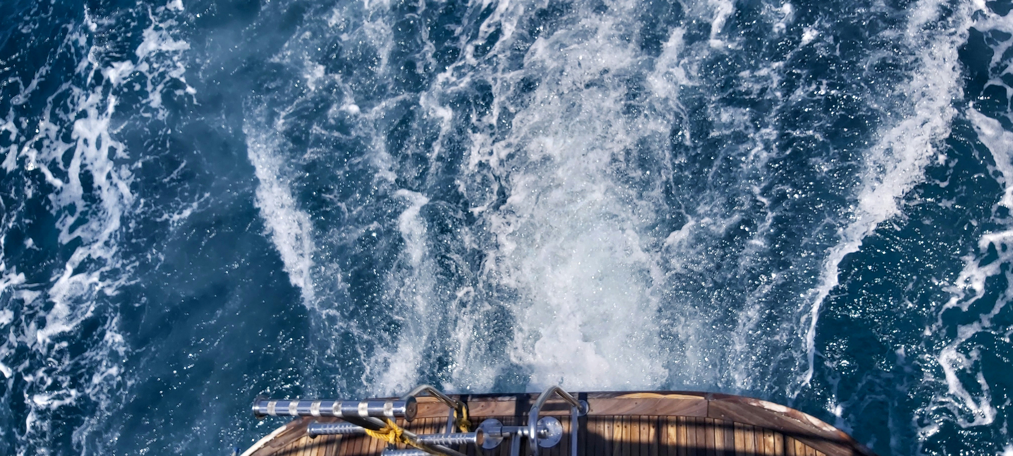 Boat in water photo – Free Blue Image on Unsplash