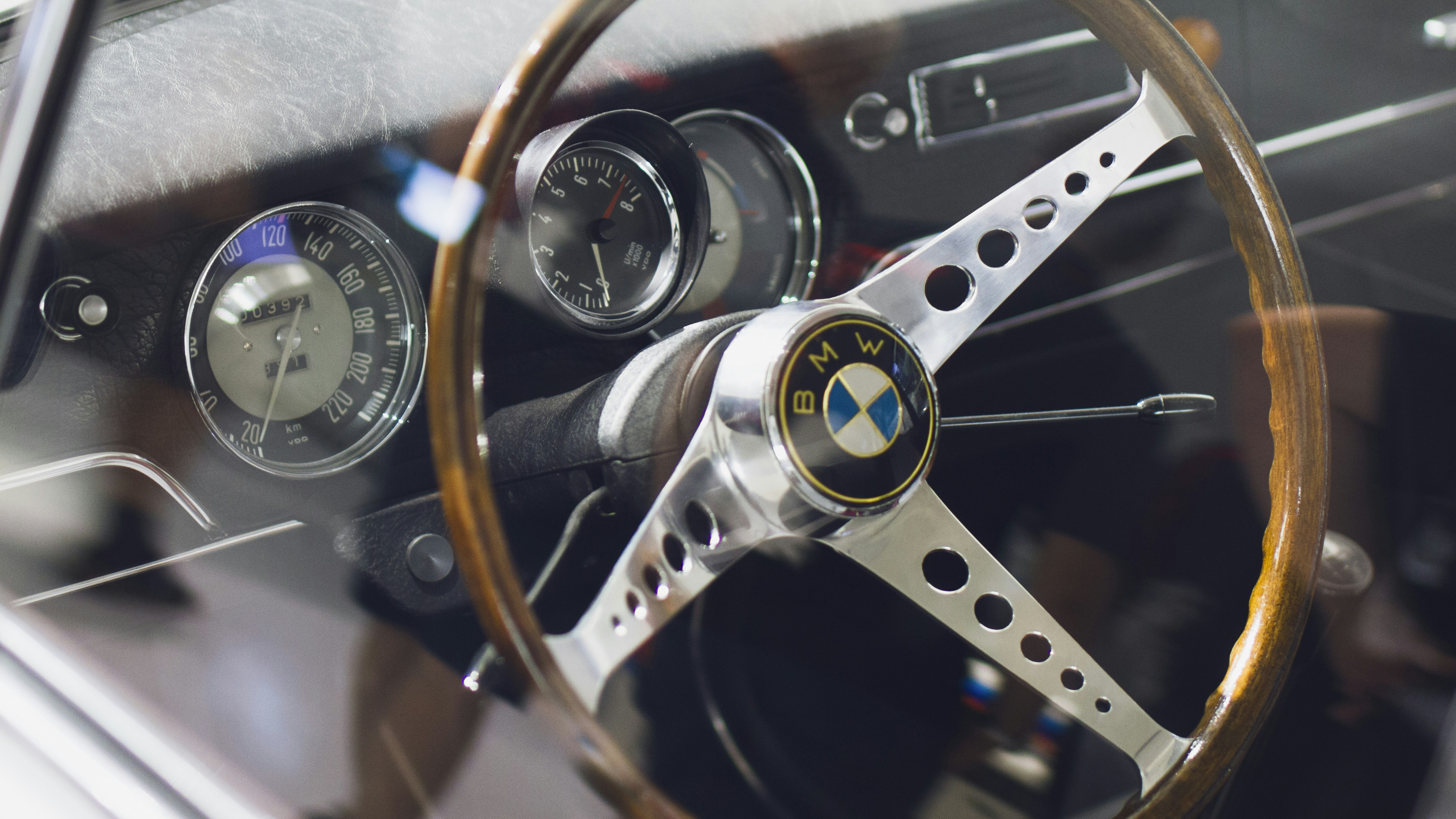 Steely Walnut: Vintage BMW Steering Wheel Close-Up
