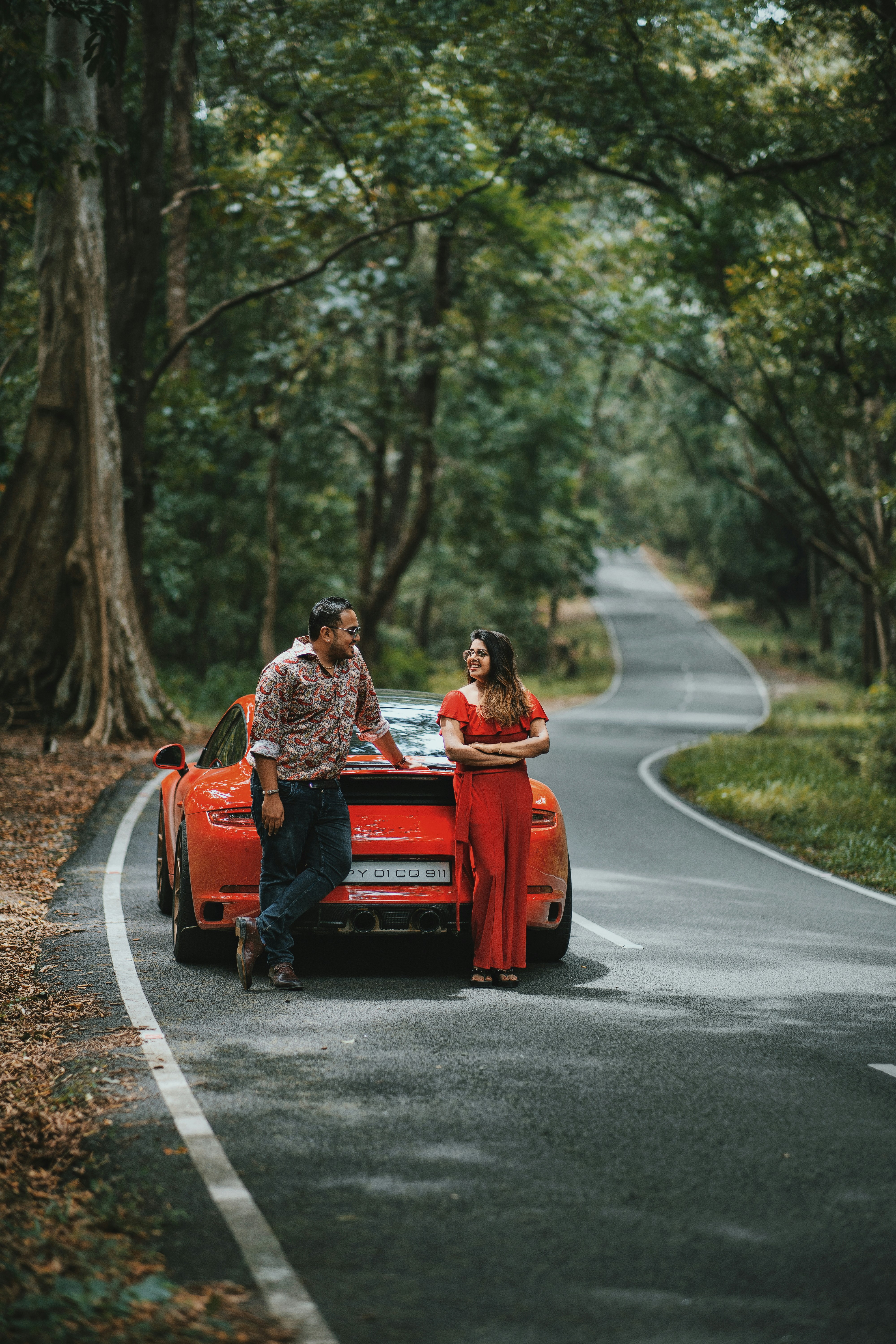 A Forest Road Pause: Love by the Red Convertible