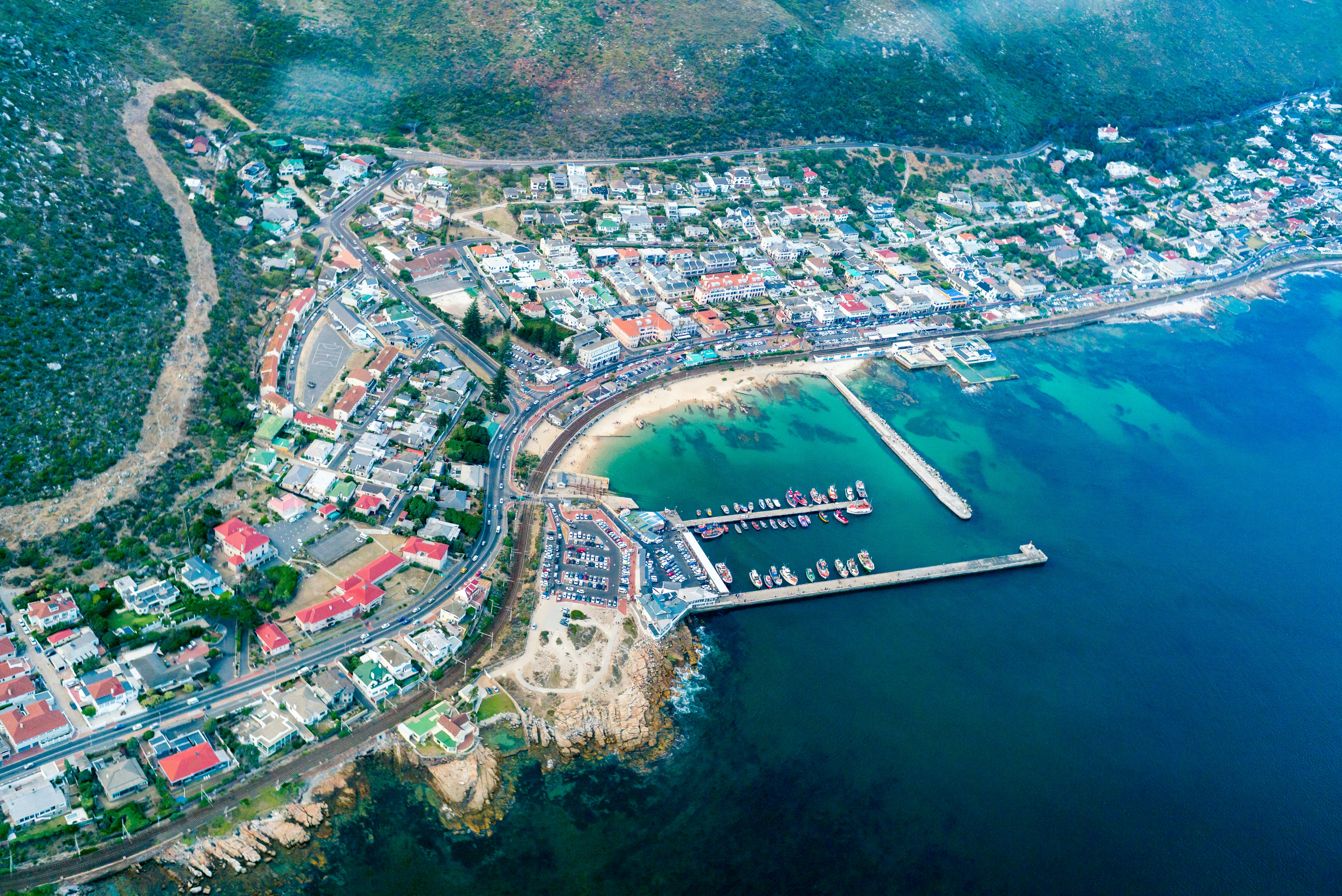 Marina Curve: Aerial Portrait of a Cliffside Coastal Town