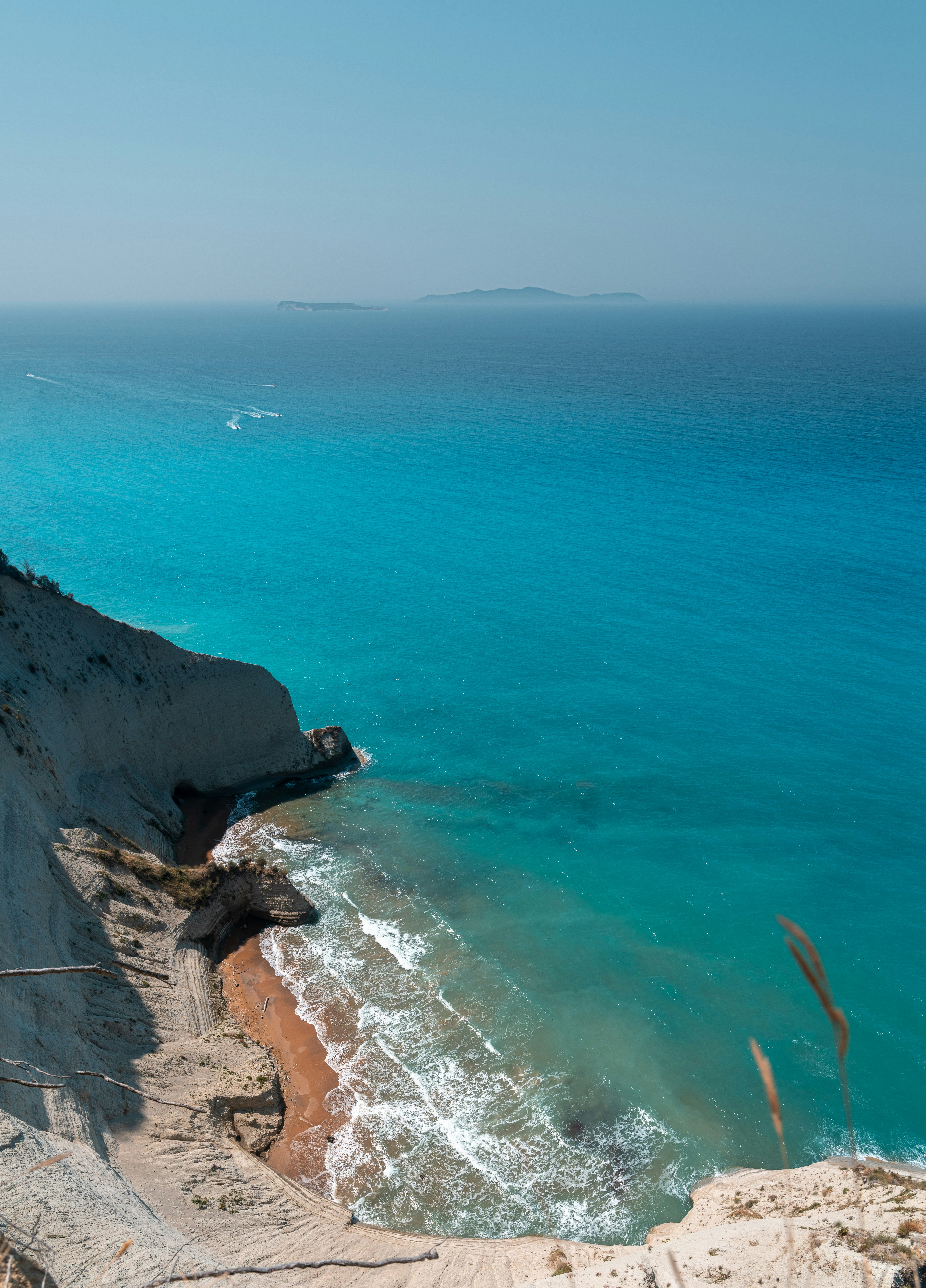 Corfu cliffs | aerial photography of body of water