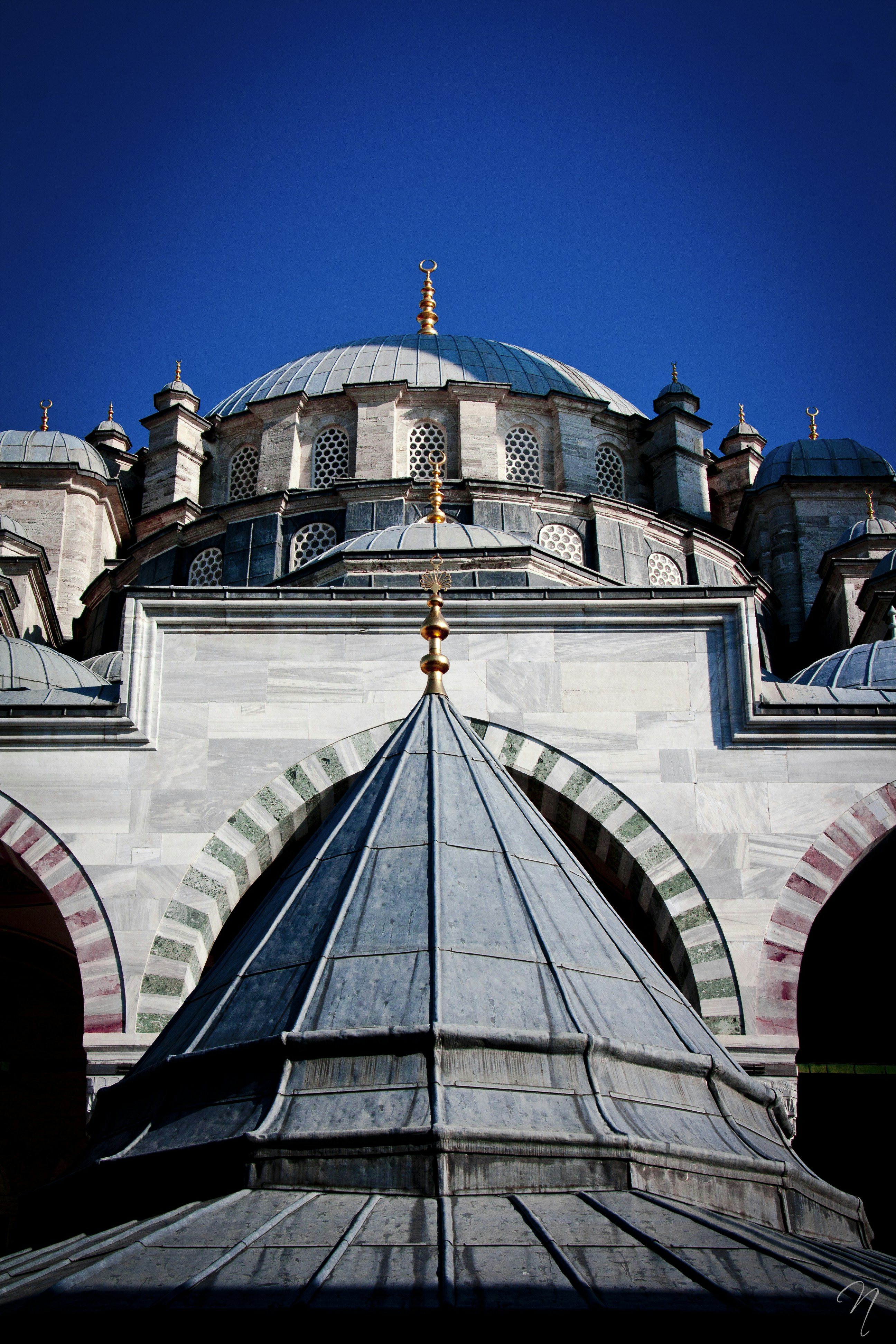 Crown of Stone: The Central Mosque Dome Reaching Toward a Deep Indigo Sky