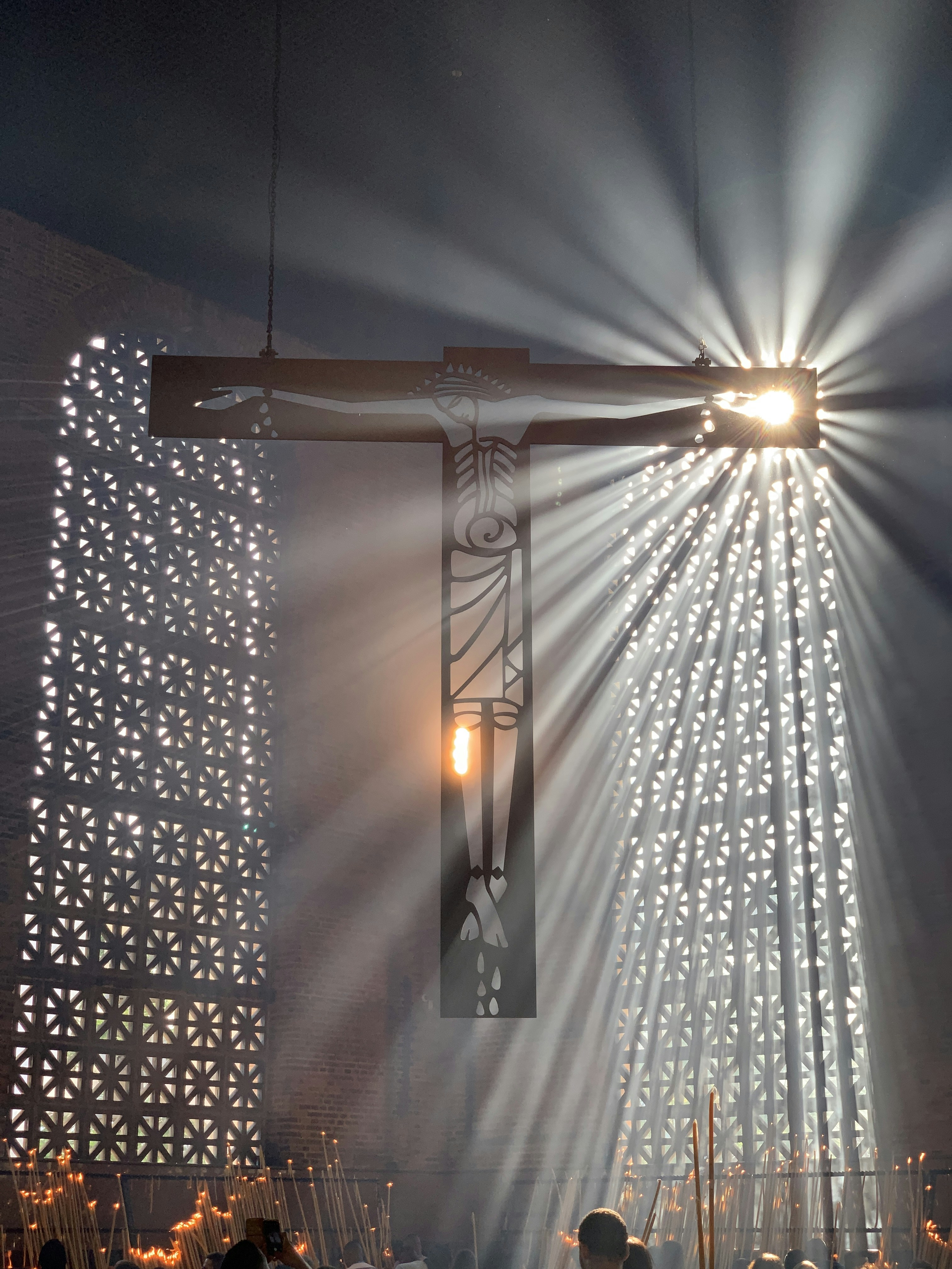 Radiant Cruciform: A Sacred Light Pierces the Night