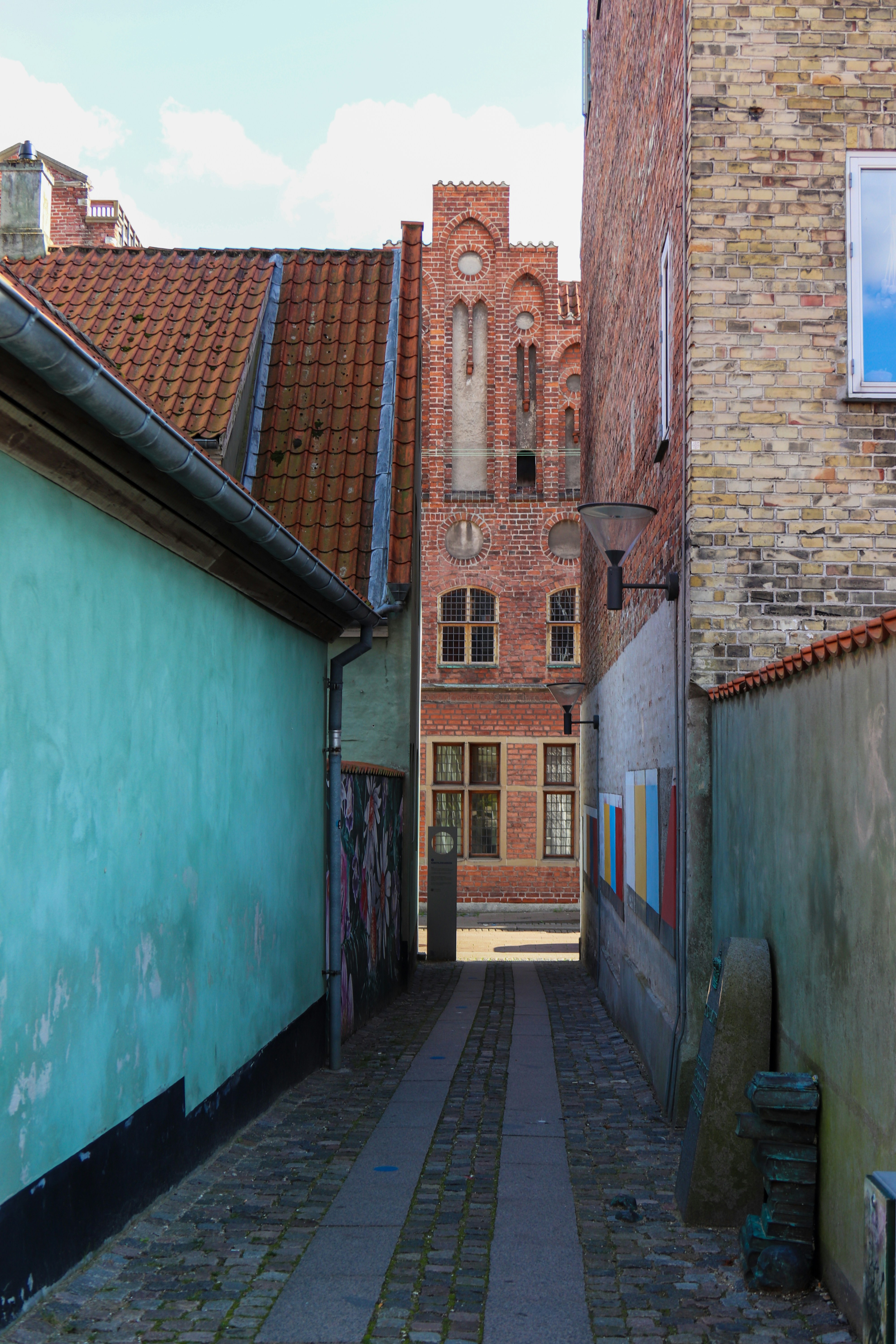 Alley of Hues: Cobblestones Toward a Brick-Gothic Facade