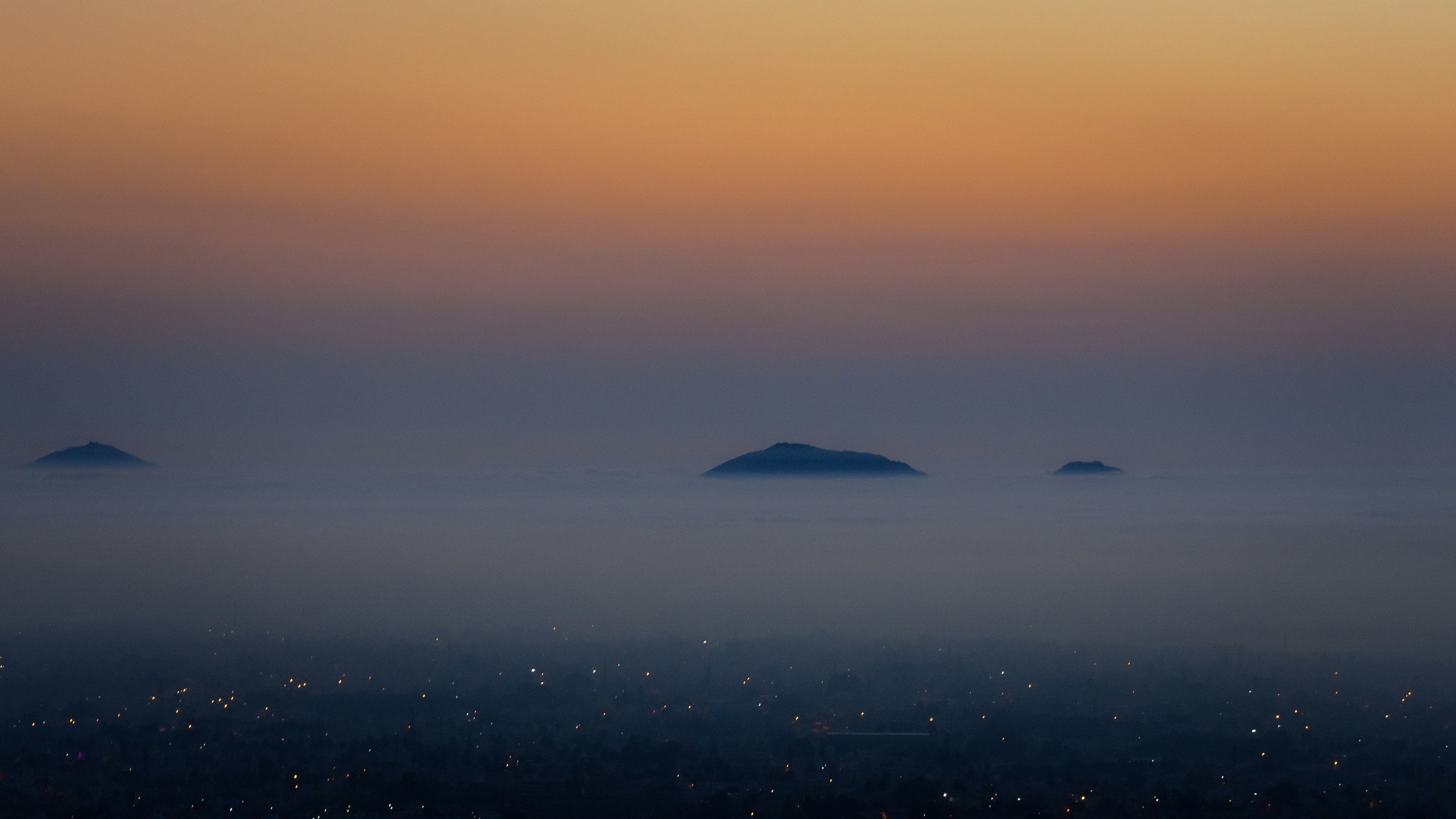 Three hills in the distance with a foggy sky photo – Free Mist Image on ...