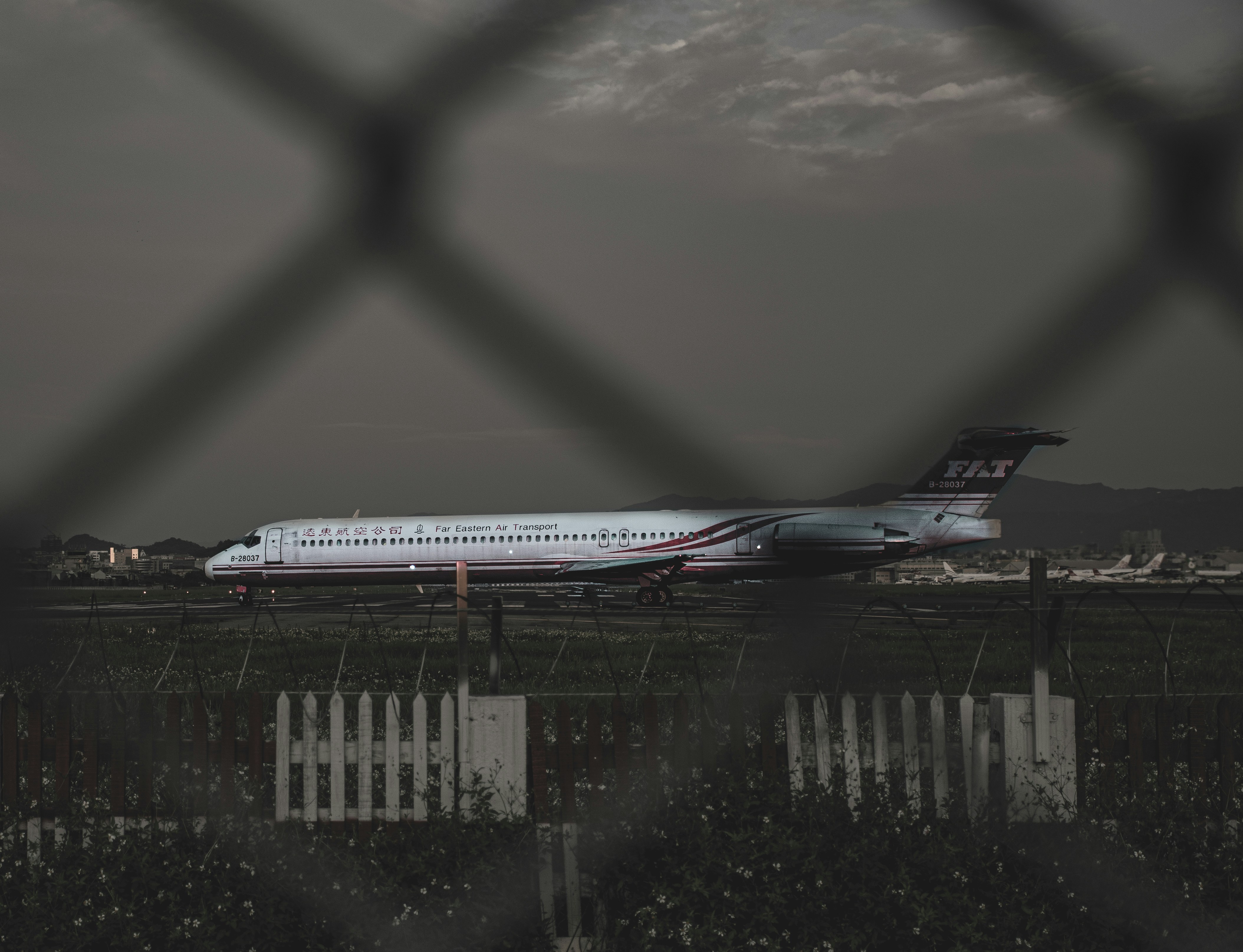 Twilight Takeoff Through the Fence