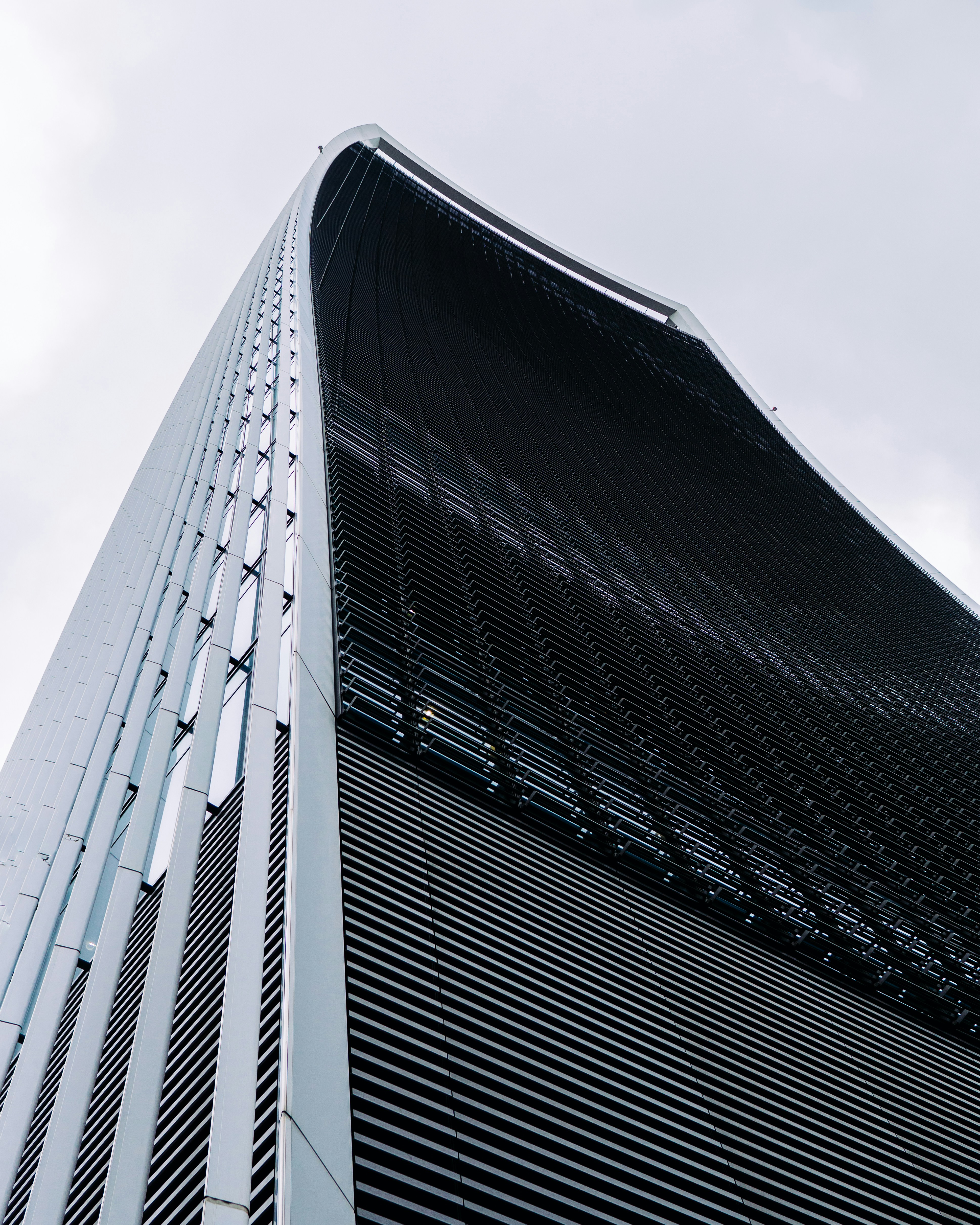 Cantilevered Curve: A Steel Ribbon Reaching for the Sky