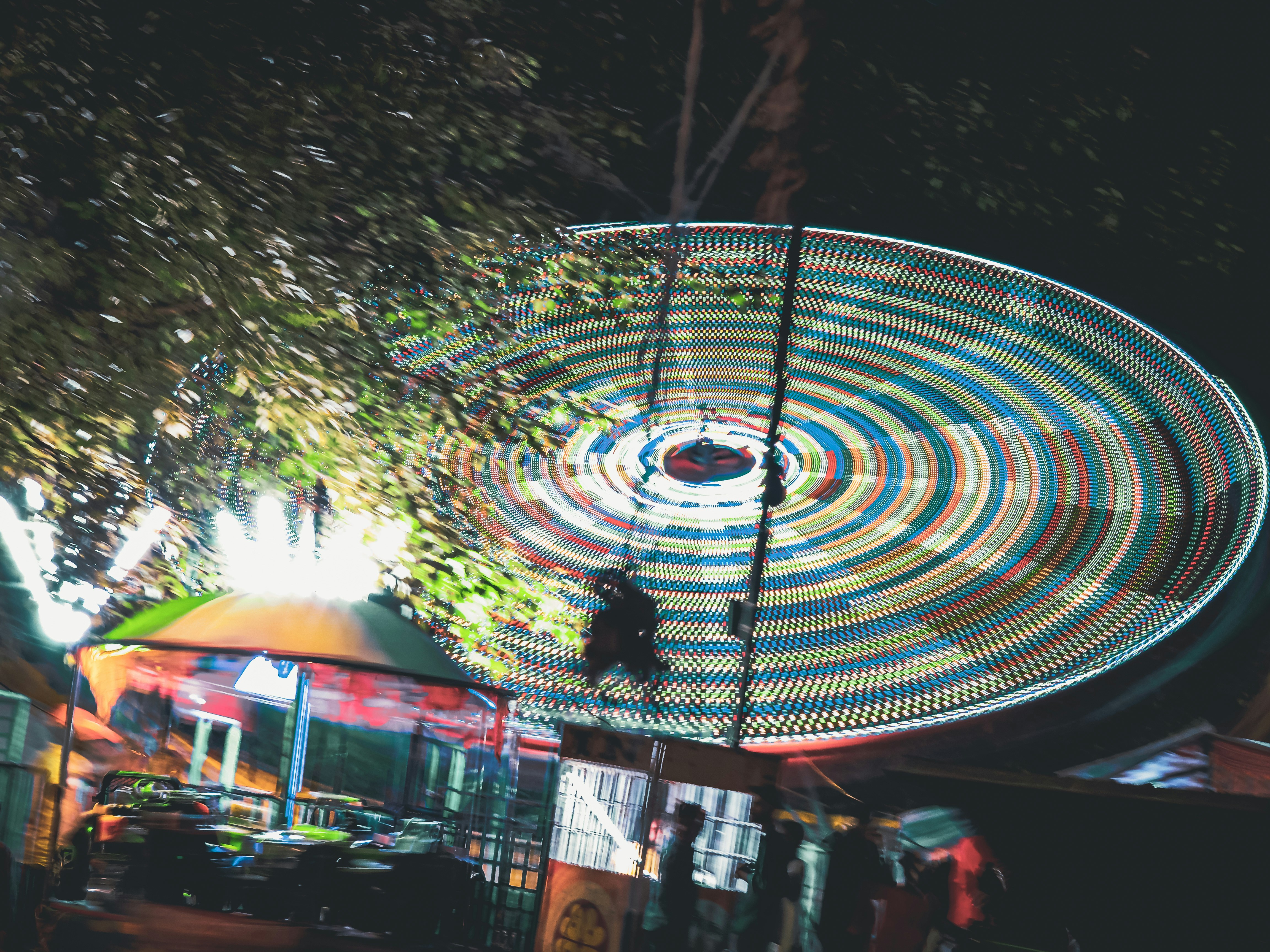 Night Carnival Spin: Long Exposure Lights in Motion