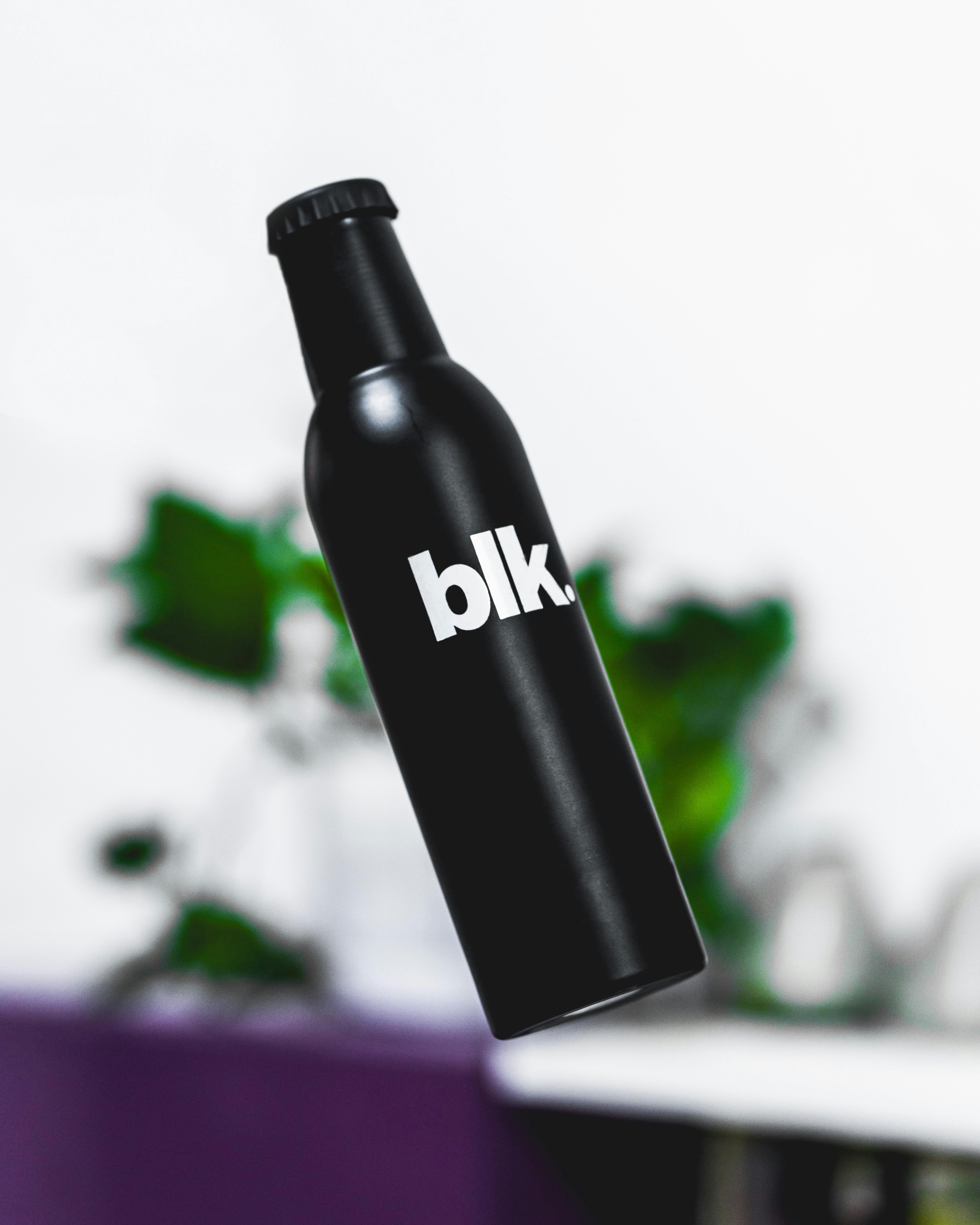 Midair Noir: The Blk Bottle in Focus