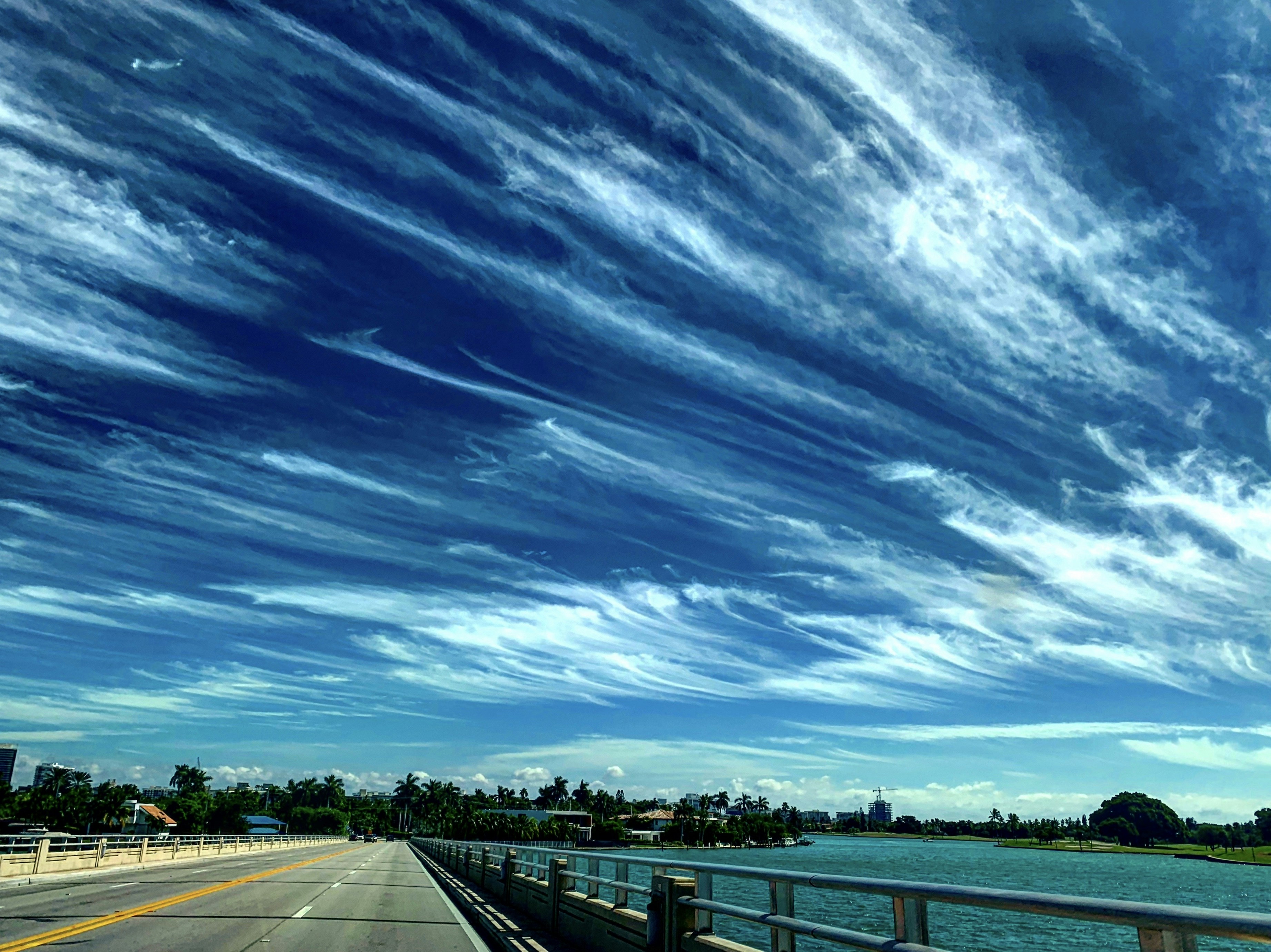 Vanishing Highway Over a Sky-Drawn Horizon