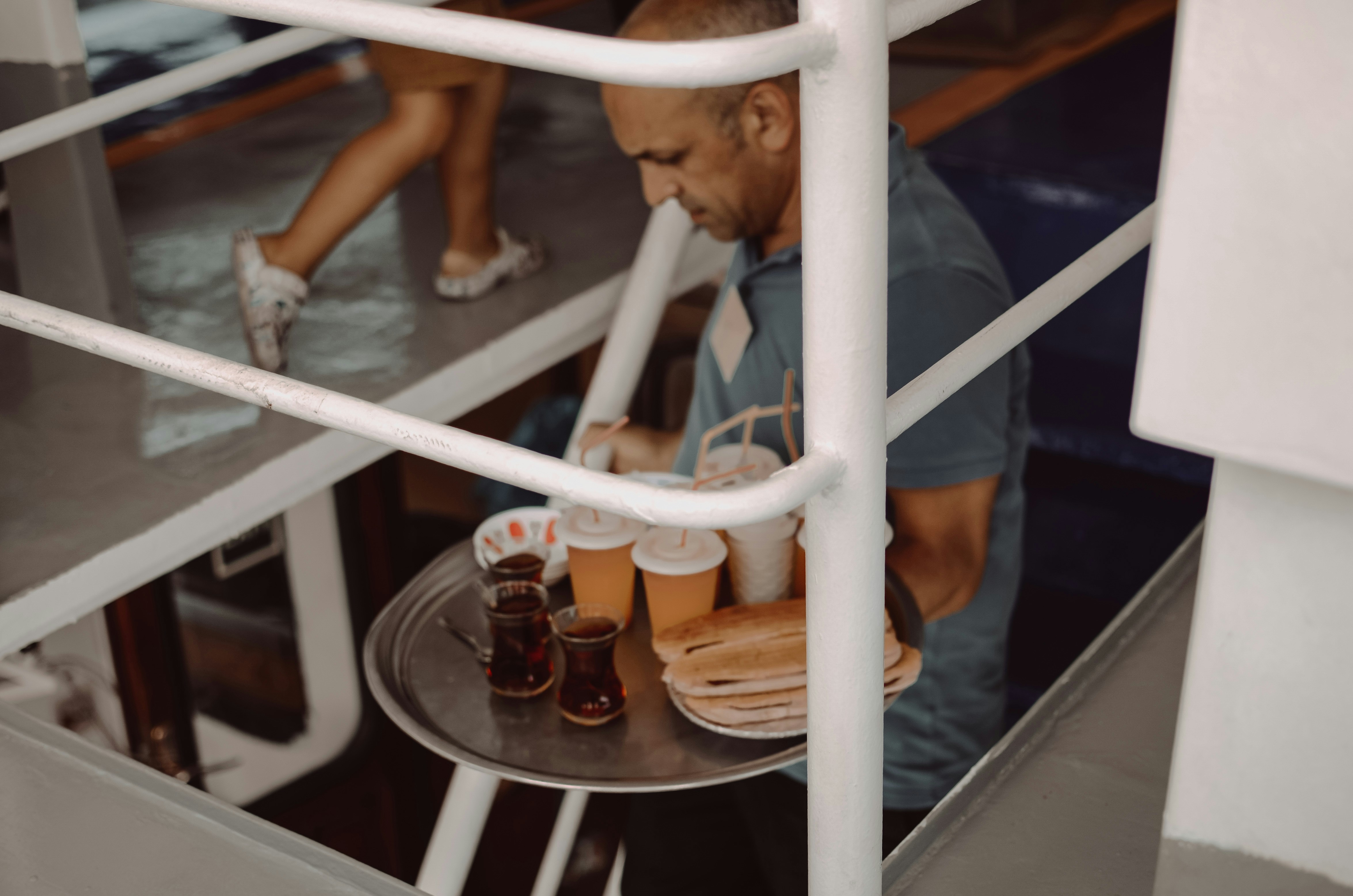 Staged Coffee Round: A Quiet Break on a Metal Staircase