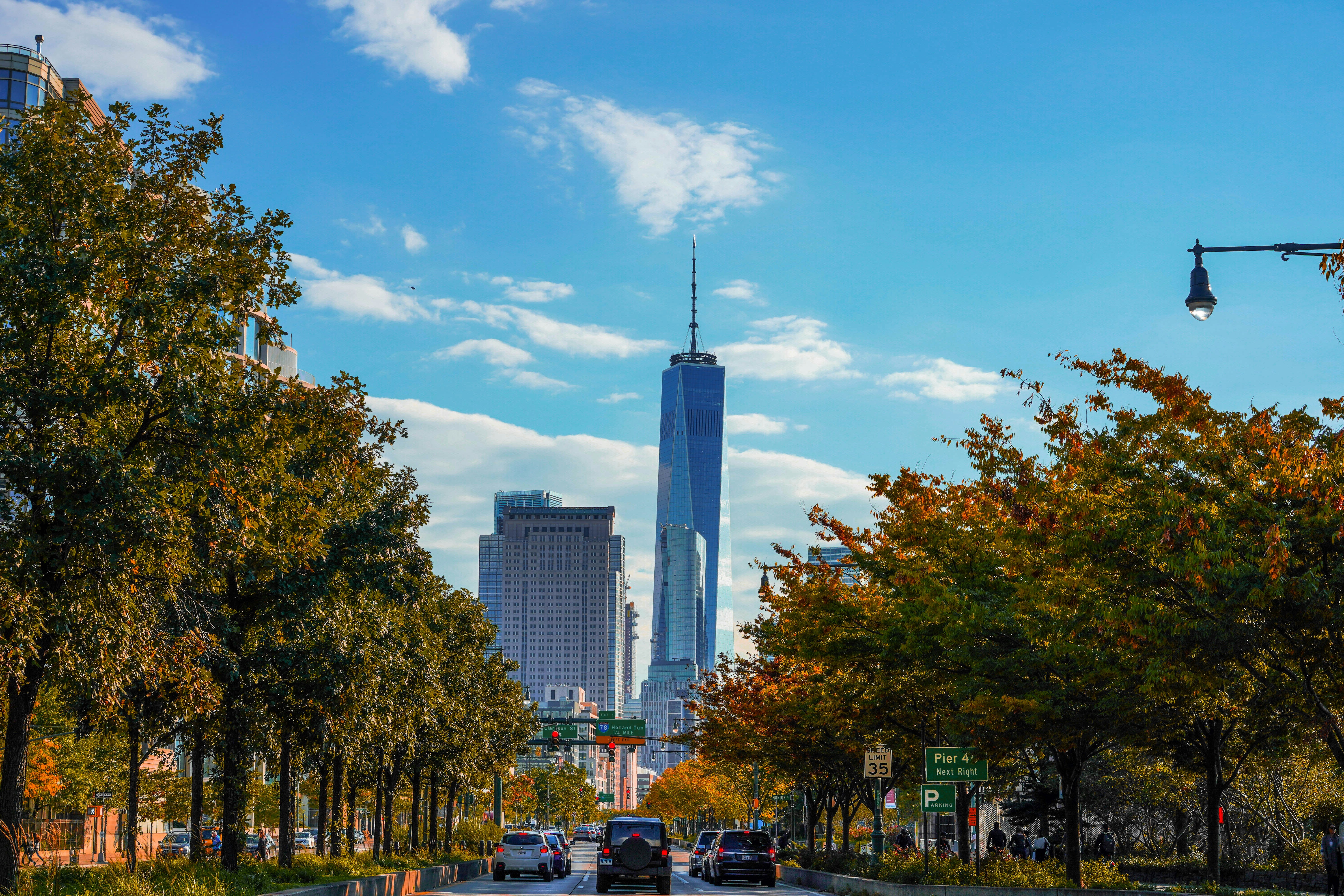 Road leading to bulding photo – Free Car Image on Unsplash
