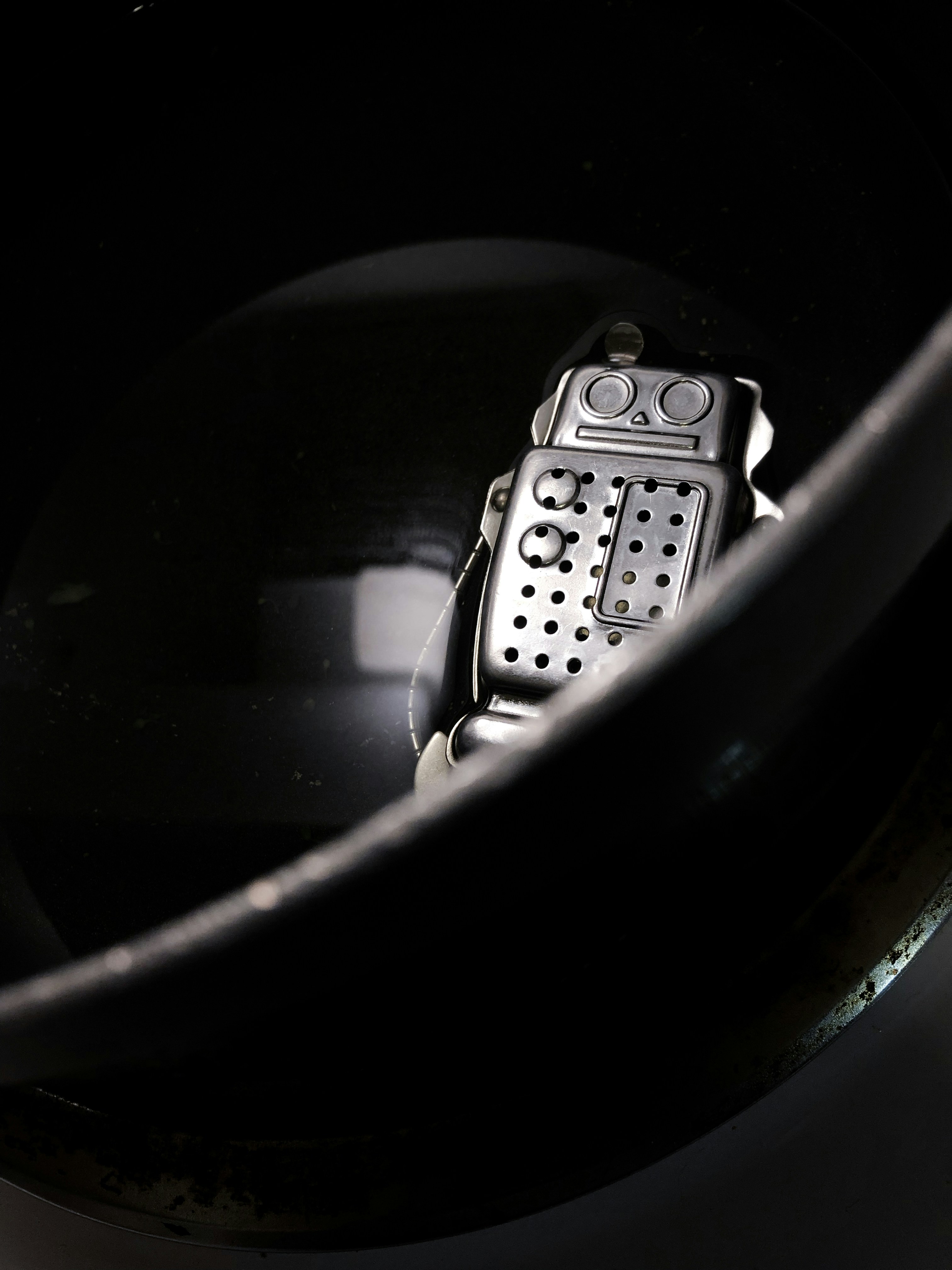 Tin Toy Robot in a Circular Spotlight