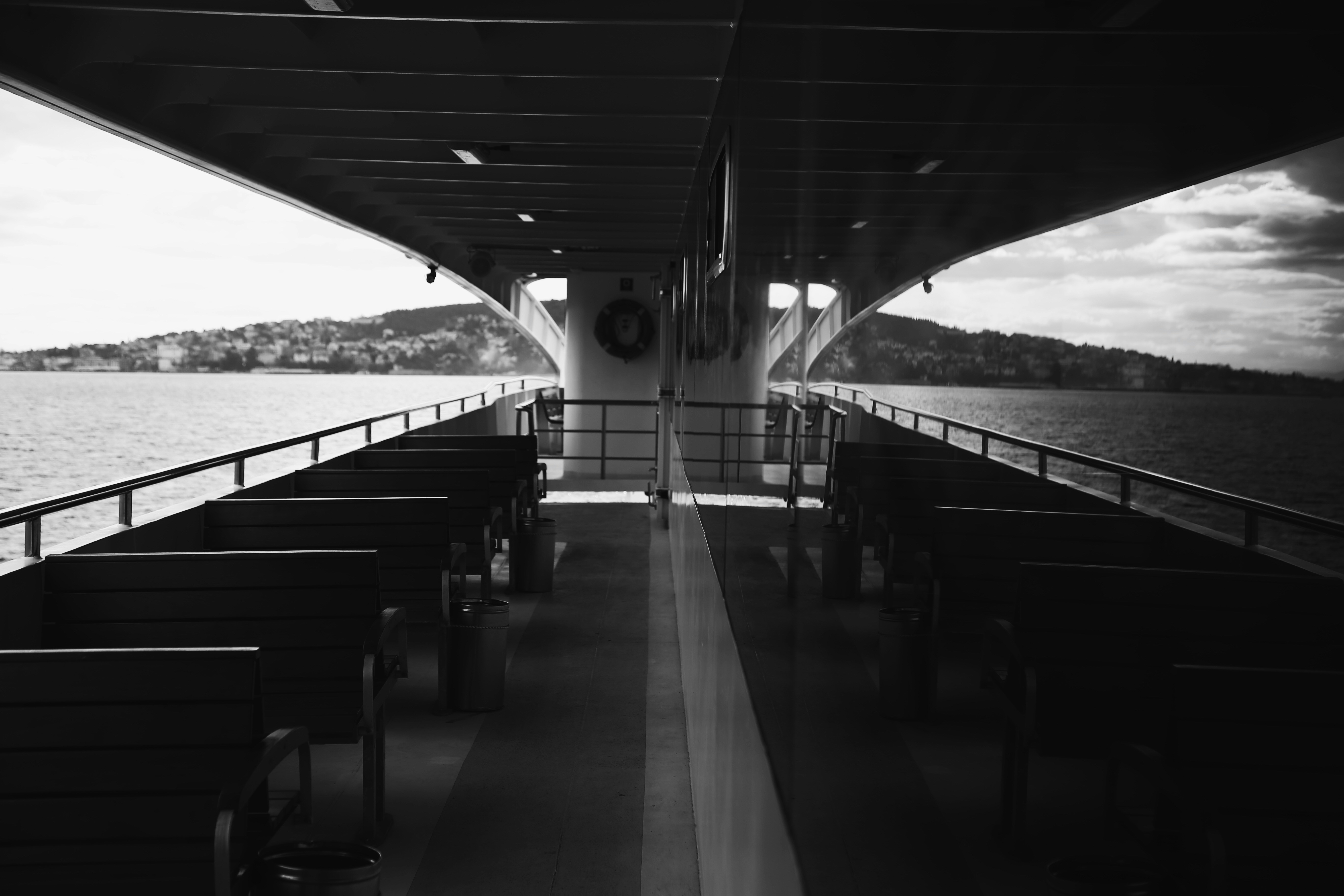 Symmetrical Passage: A Quiet Deck toward the Distant Shore