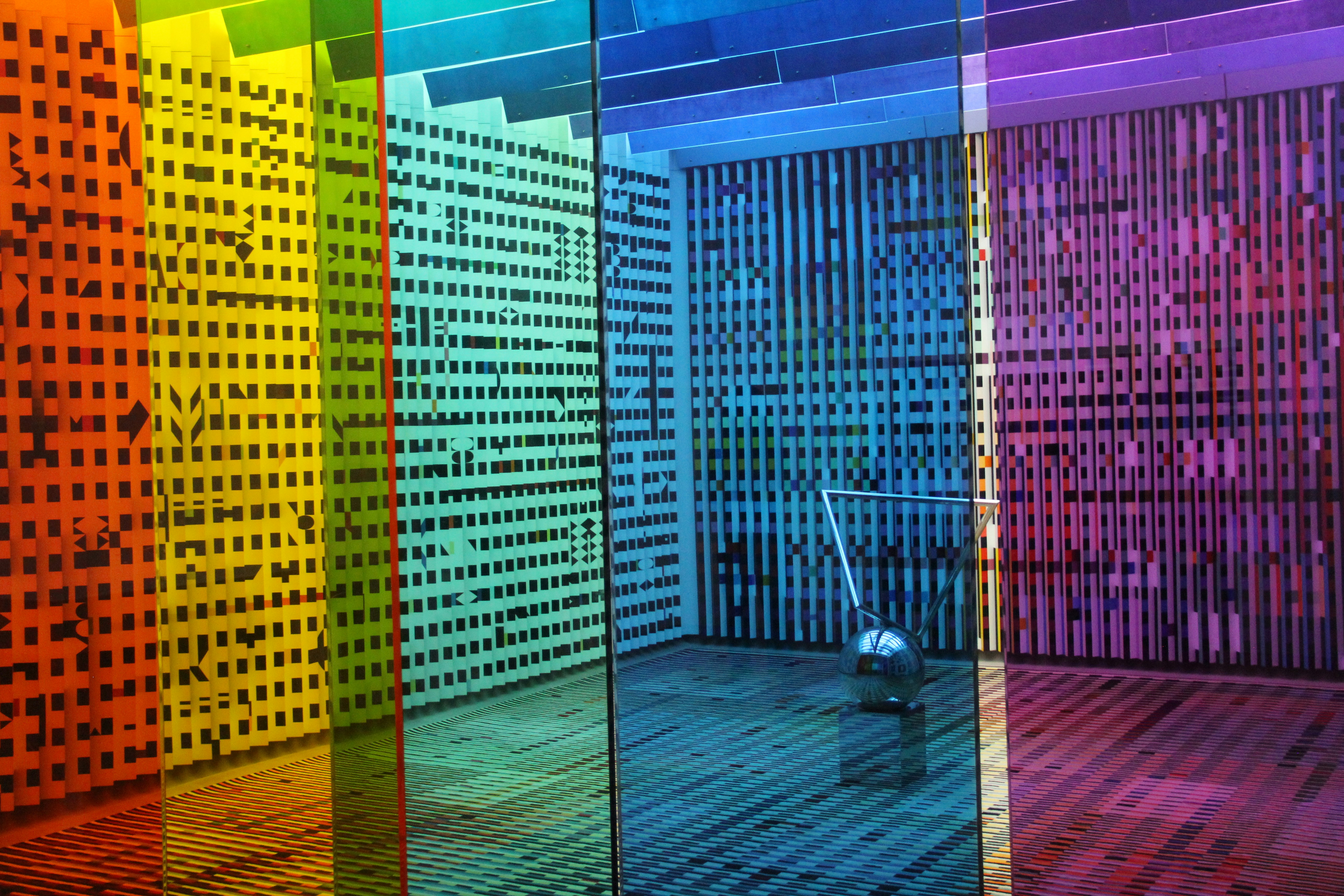 A room with a lot of different colored walls photo – Free Building ...