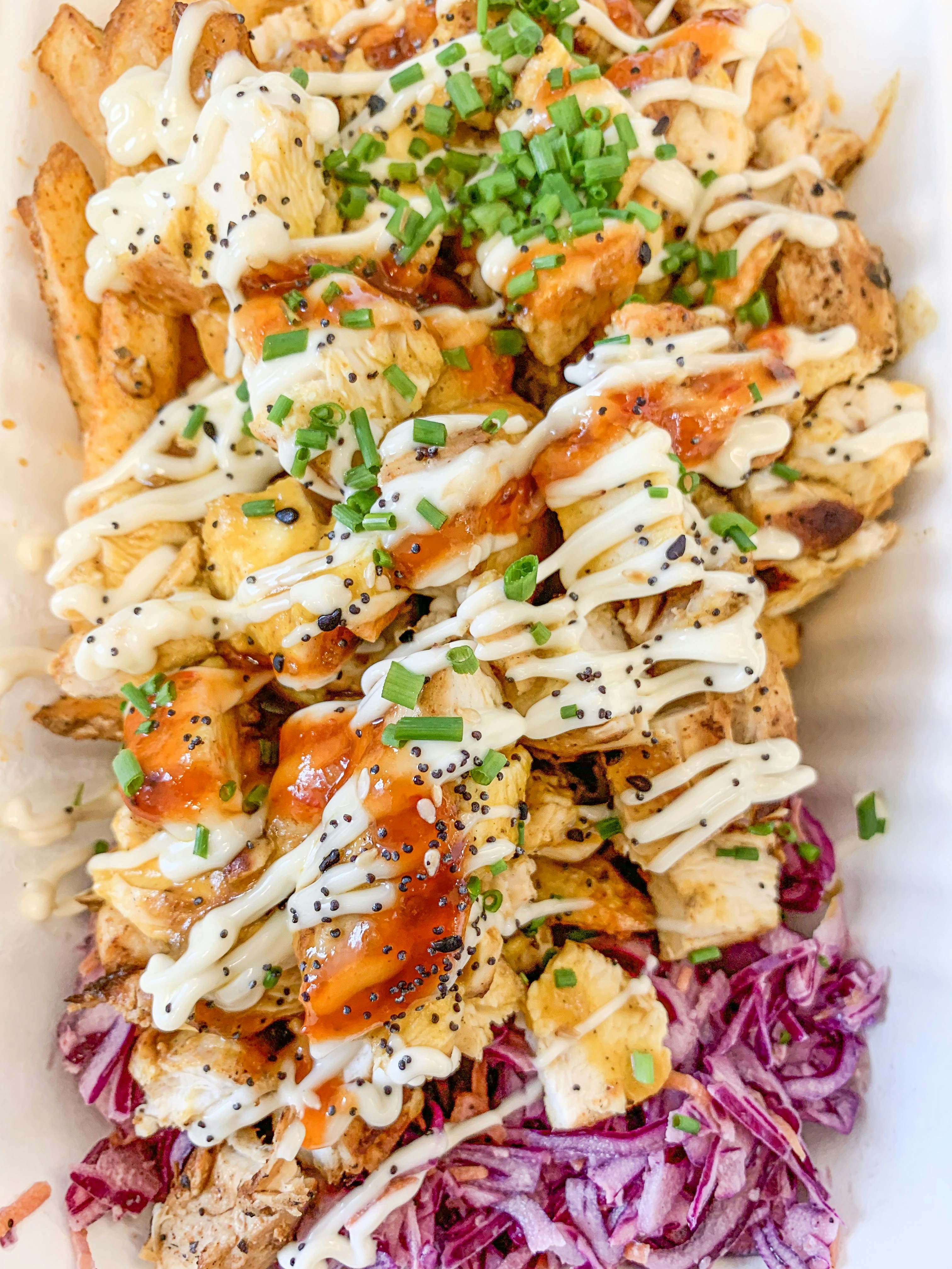 Drizzle-Stacked Loaded Fries with Charred Chicken and Violet Slaw