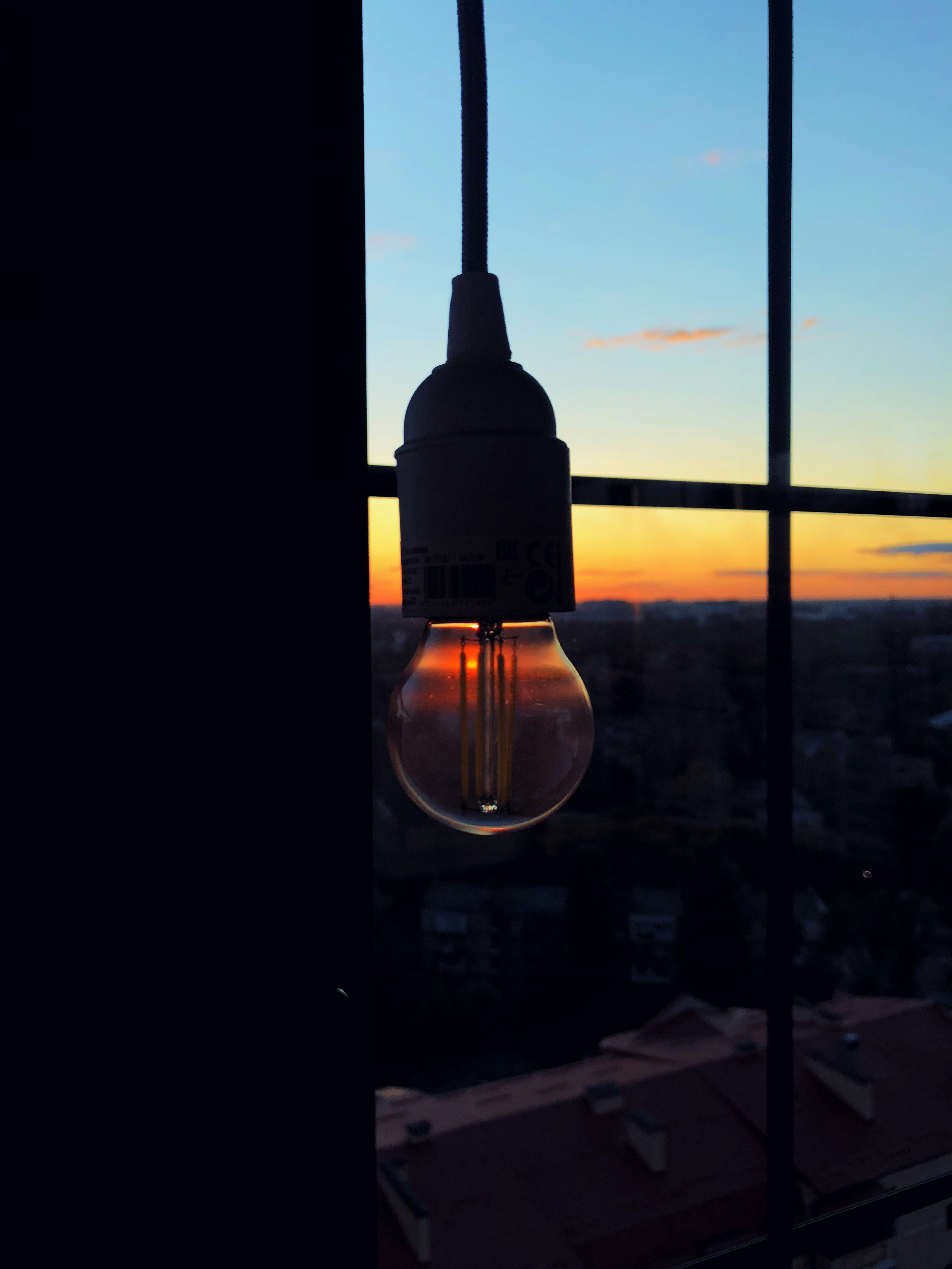 Light bulb and a sunset