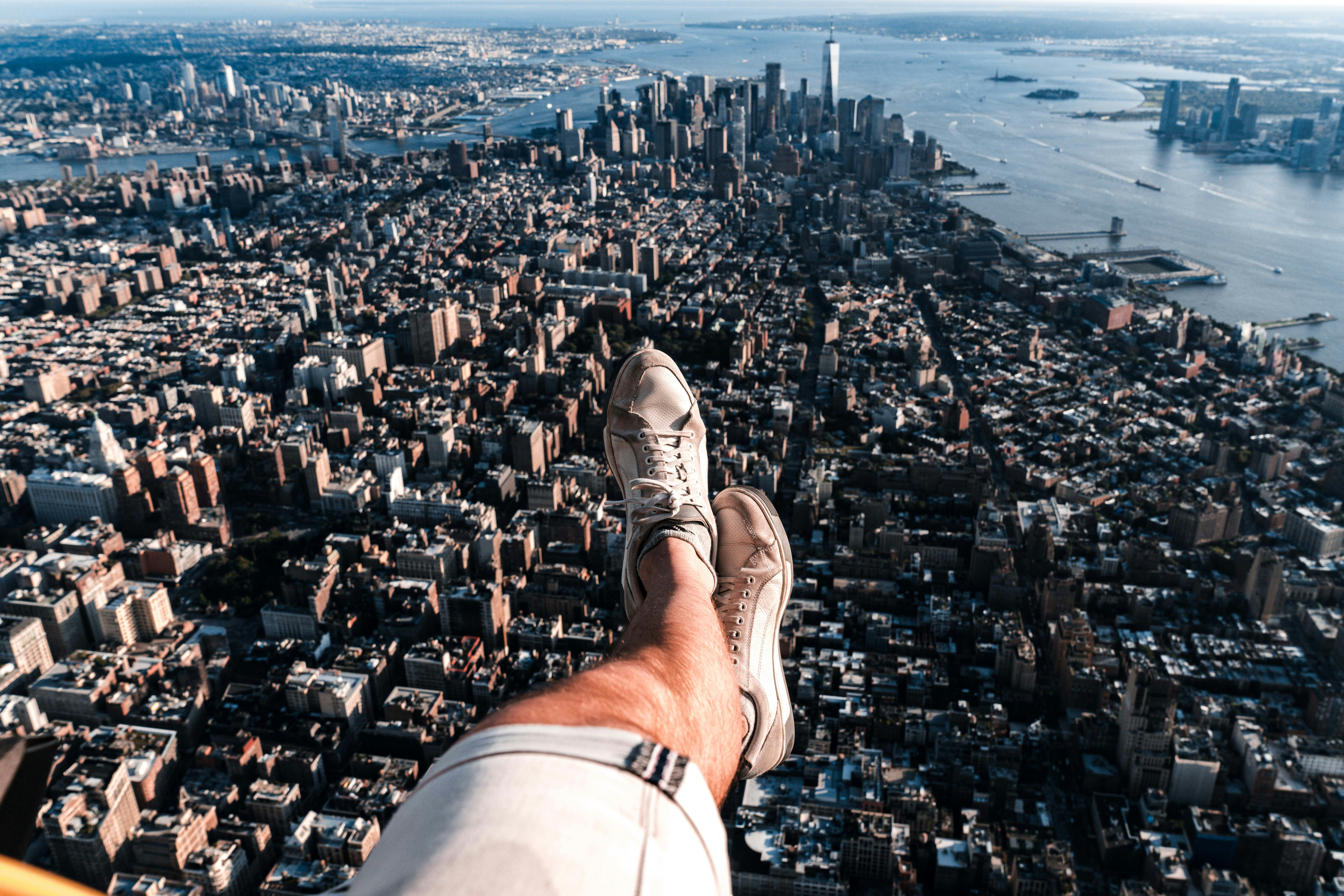 Soaring Over the City: Shoes and Skyline from Above