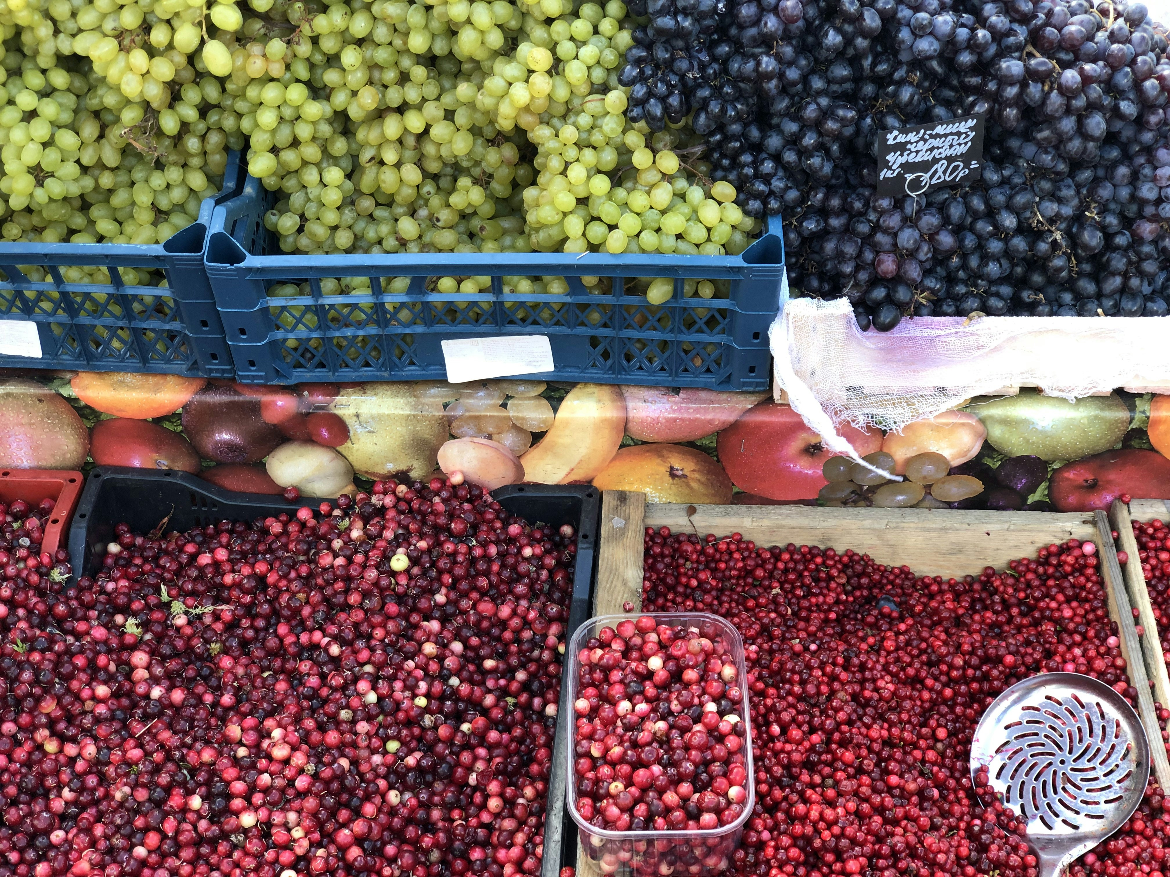Colorful Crates: A Fresh Market Grapes and Berries Display