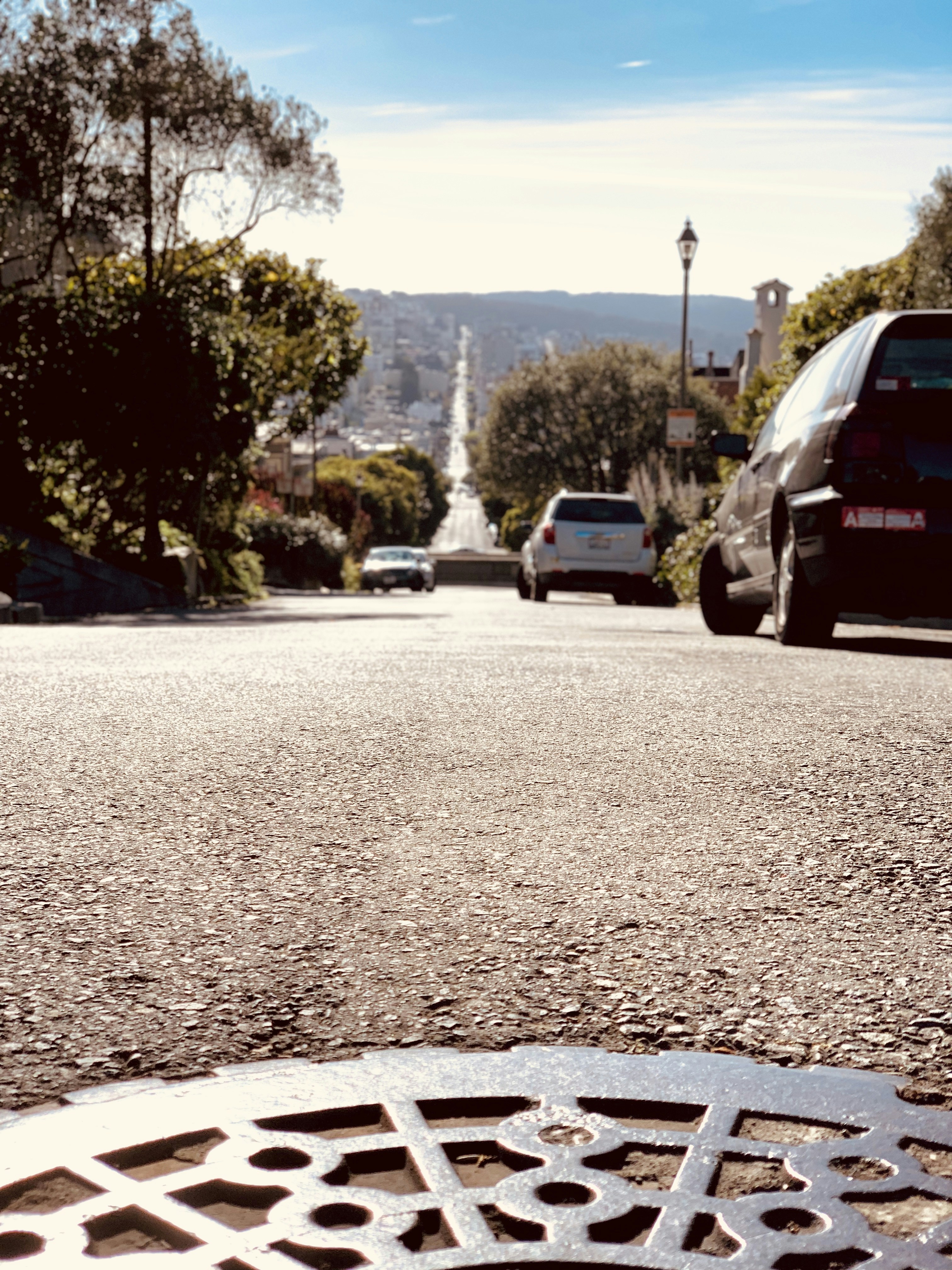 Low-Angle Streetline: Gazing Toward a Distant City Fountain