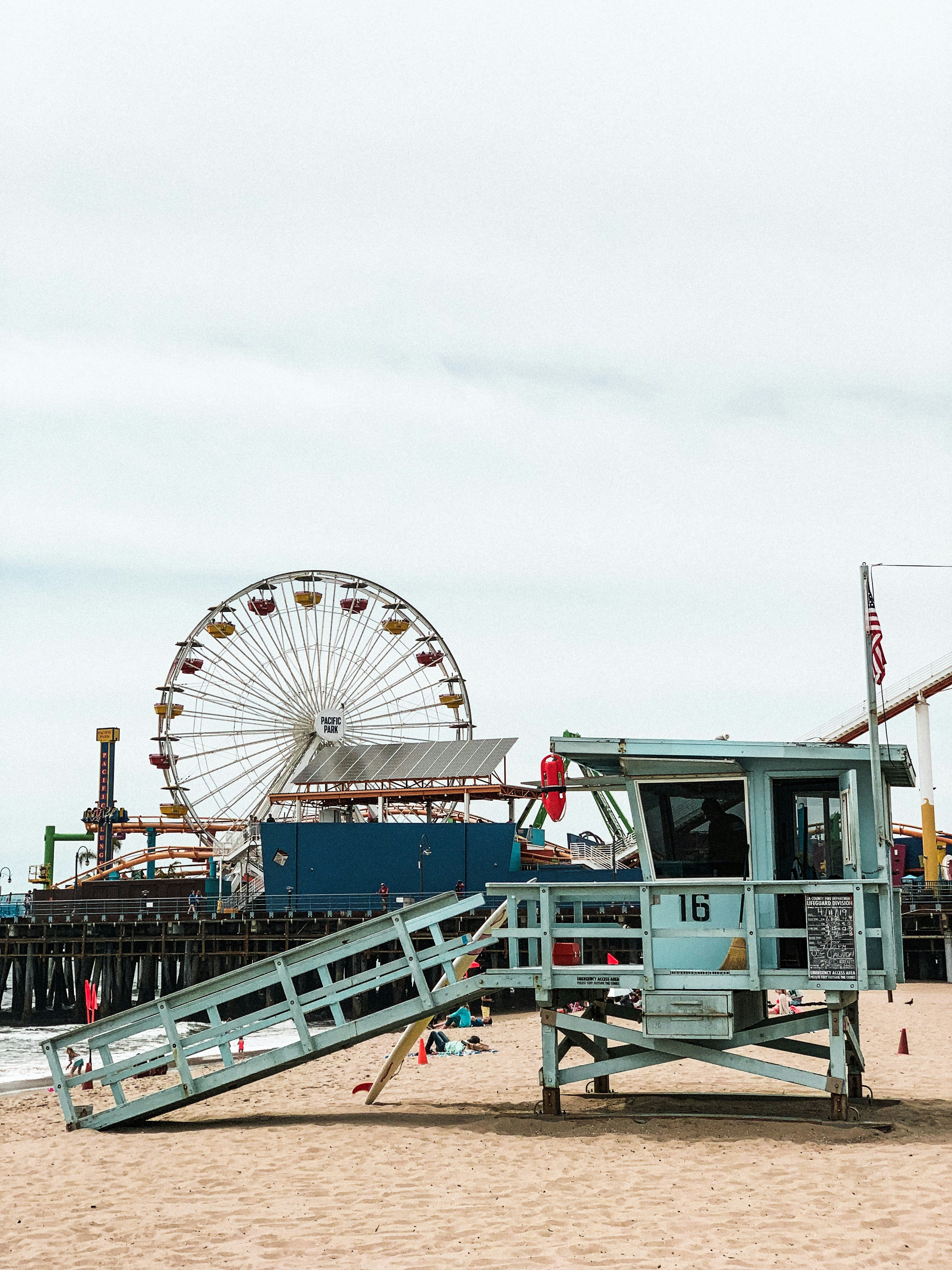 Green lifeguard shade in seashore photo – Free Los angeles Image on ...