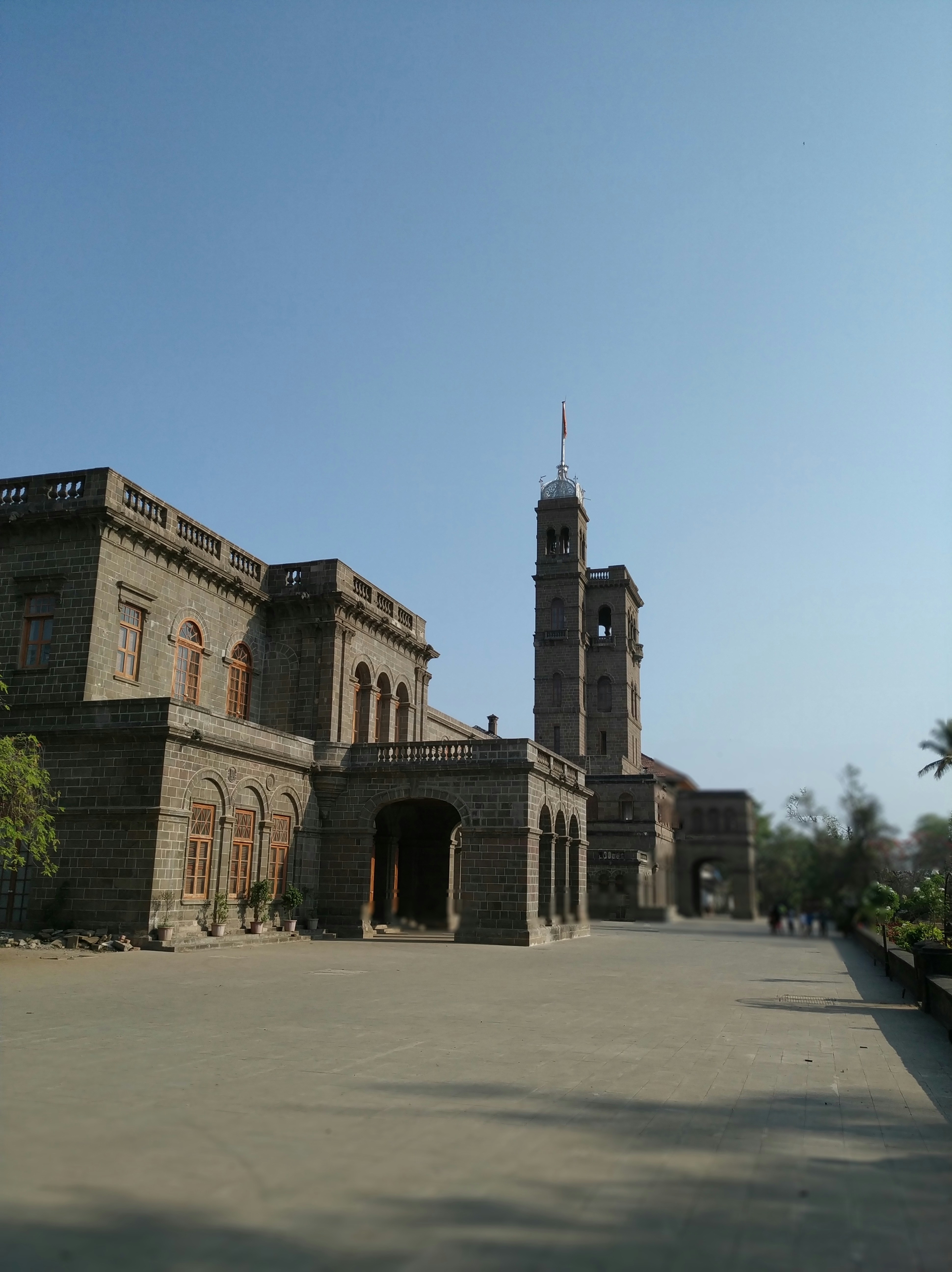 Pune University - Summer Season | gray concrete building