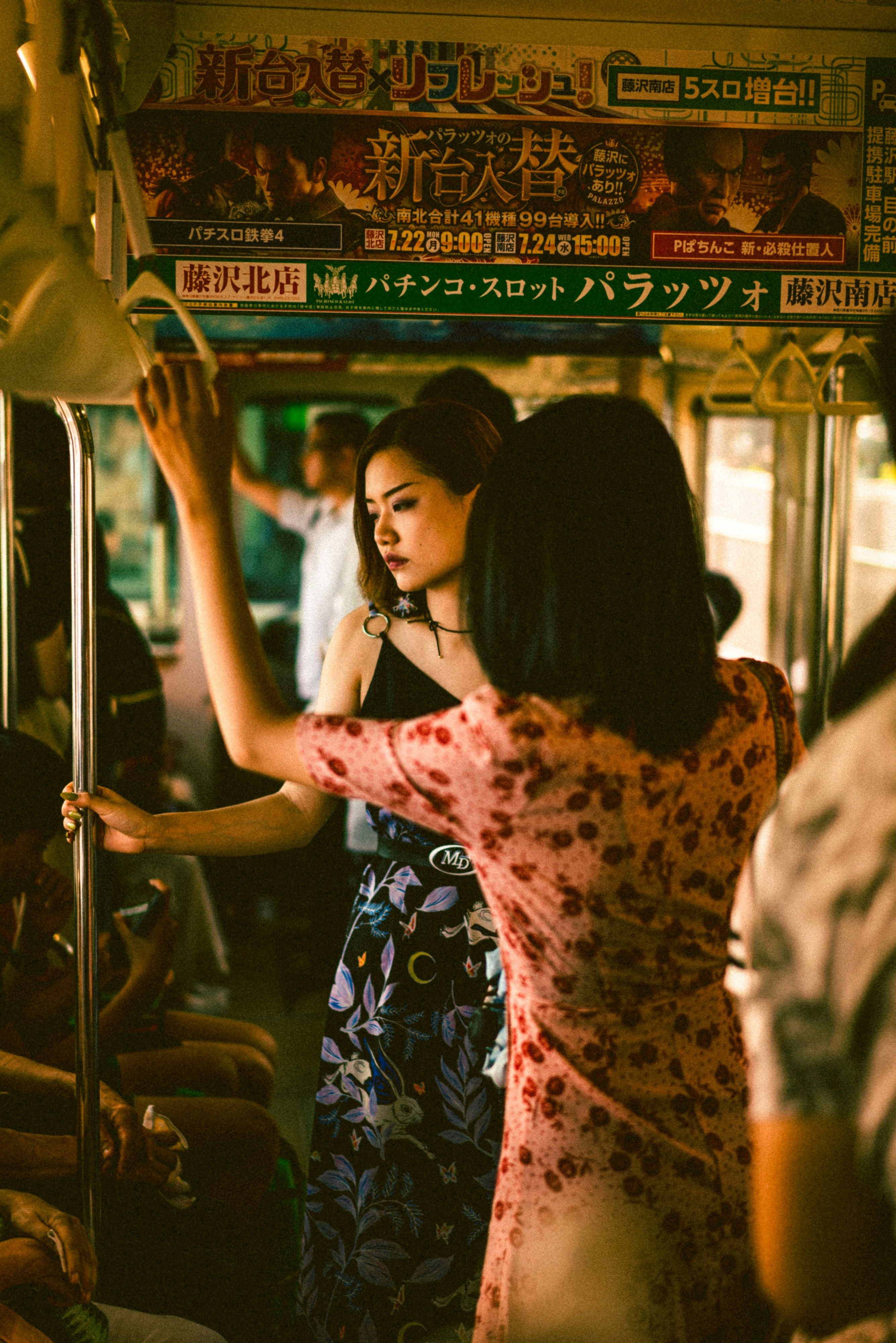 Two Women in a Dusk-tinged Subway Moment