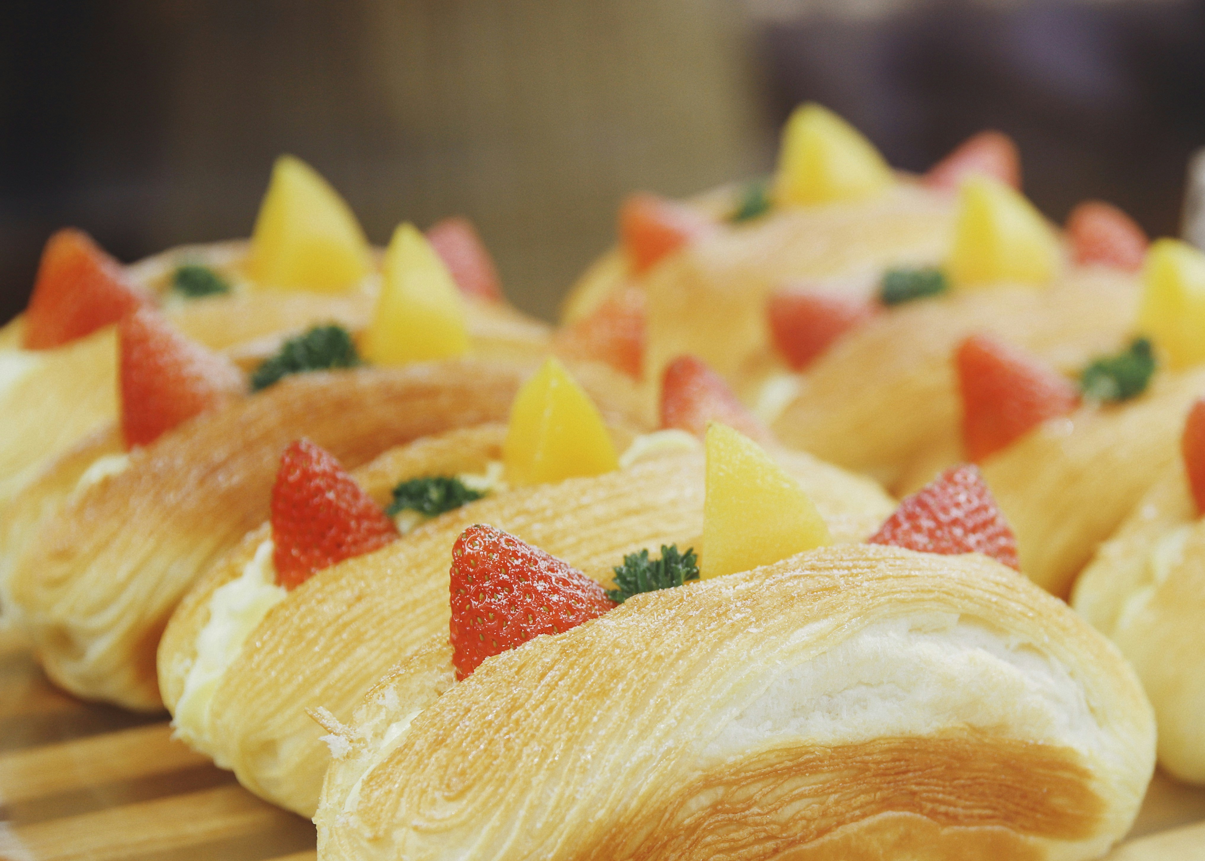 Crescent pastries crowned with fruit jewels