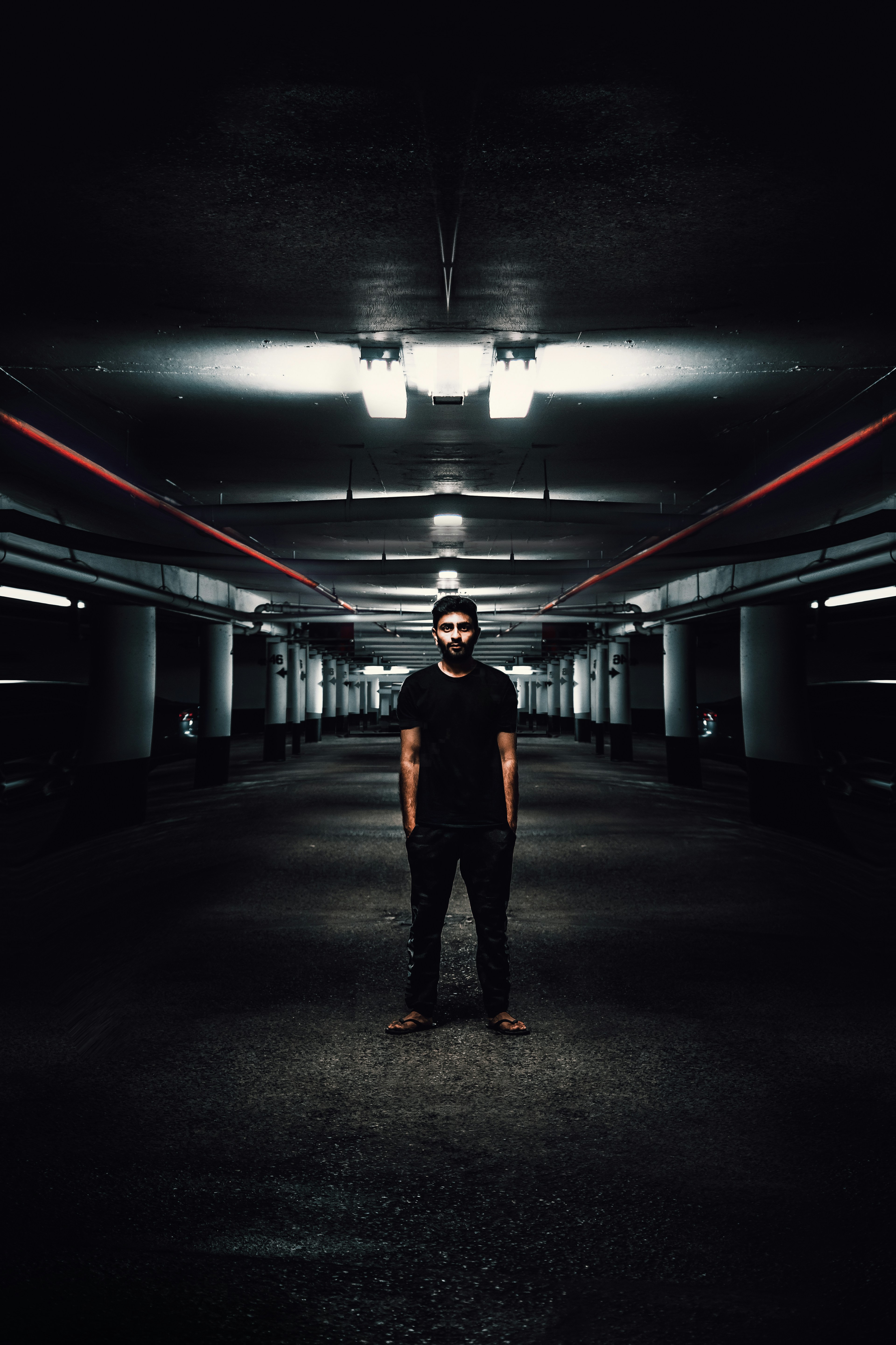Man standing inside building photo – Free Poster Image on Unsplash