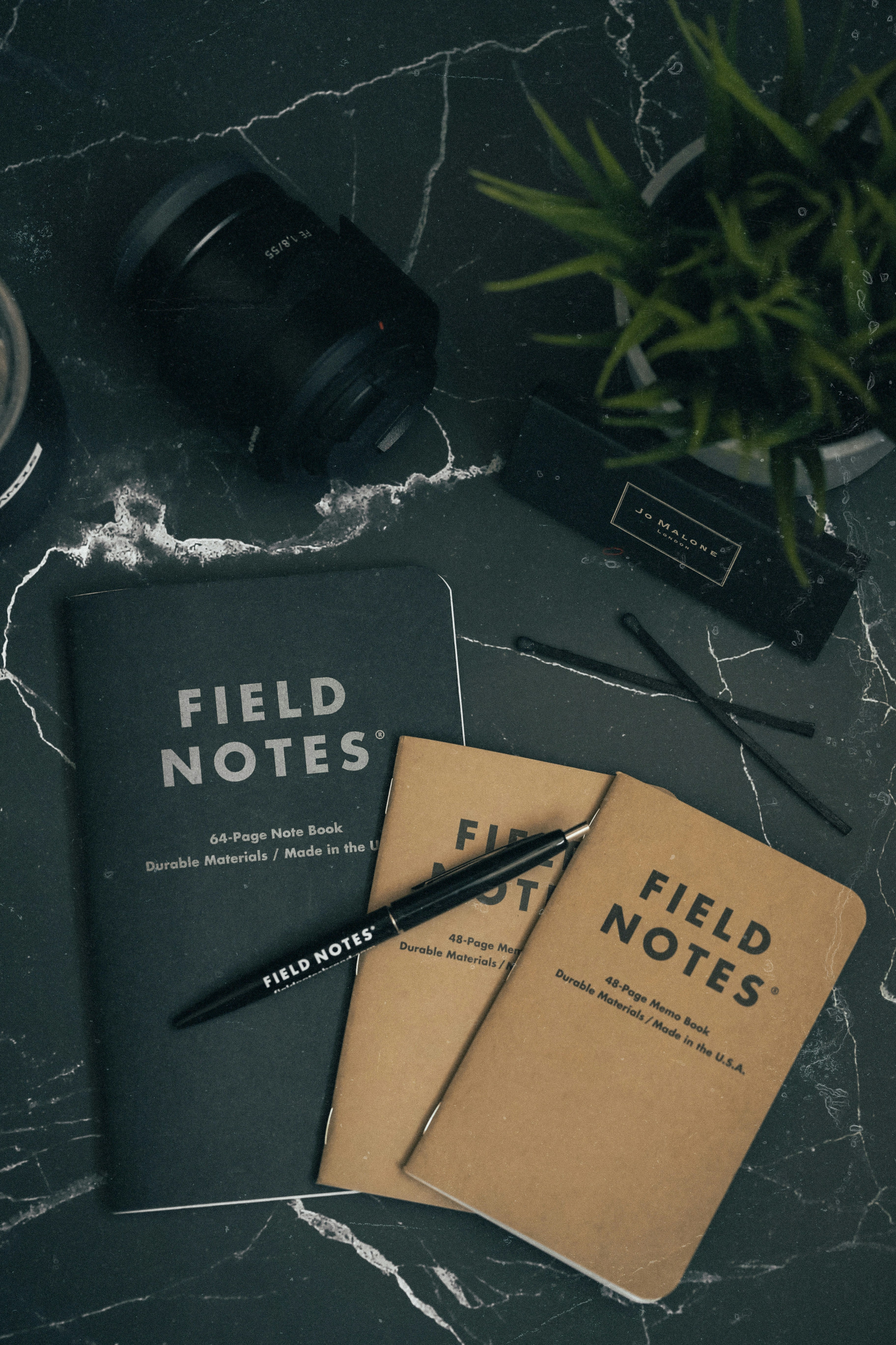 Two brown and black field notes books photo – Free Grey Image on Unsplash