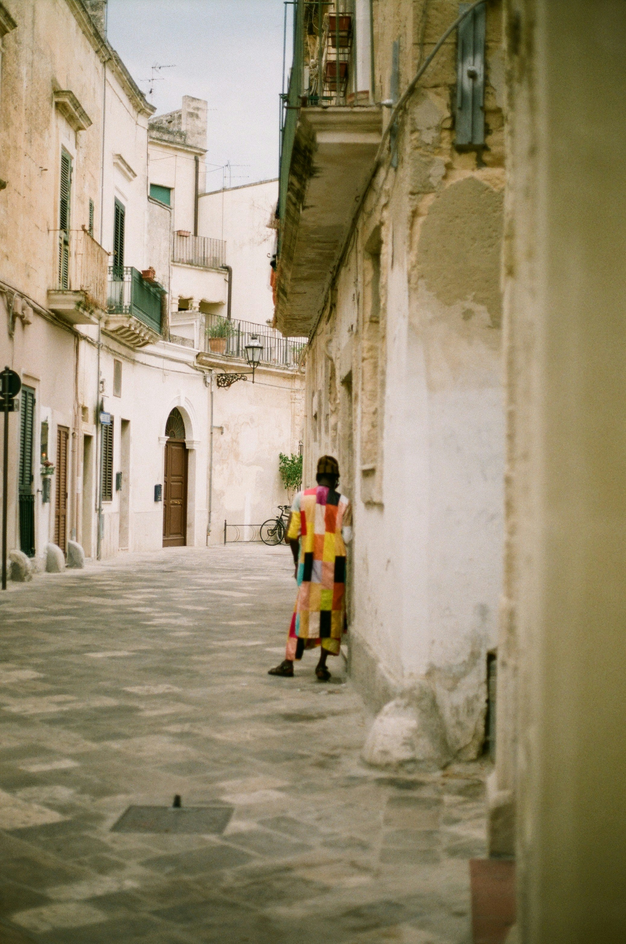 Woman standing beside building during day photo – Free Italy Image on ...