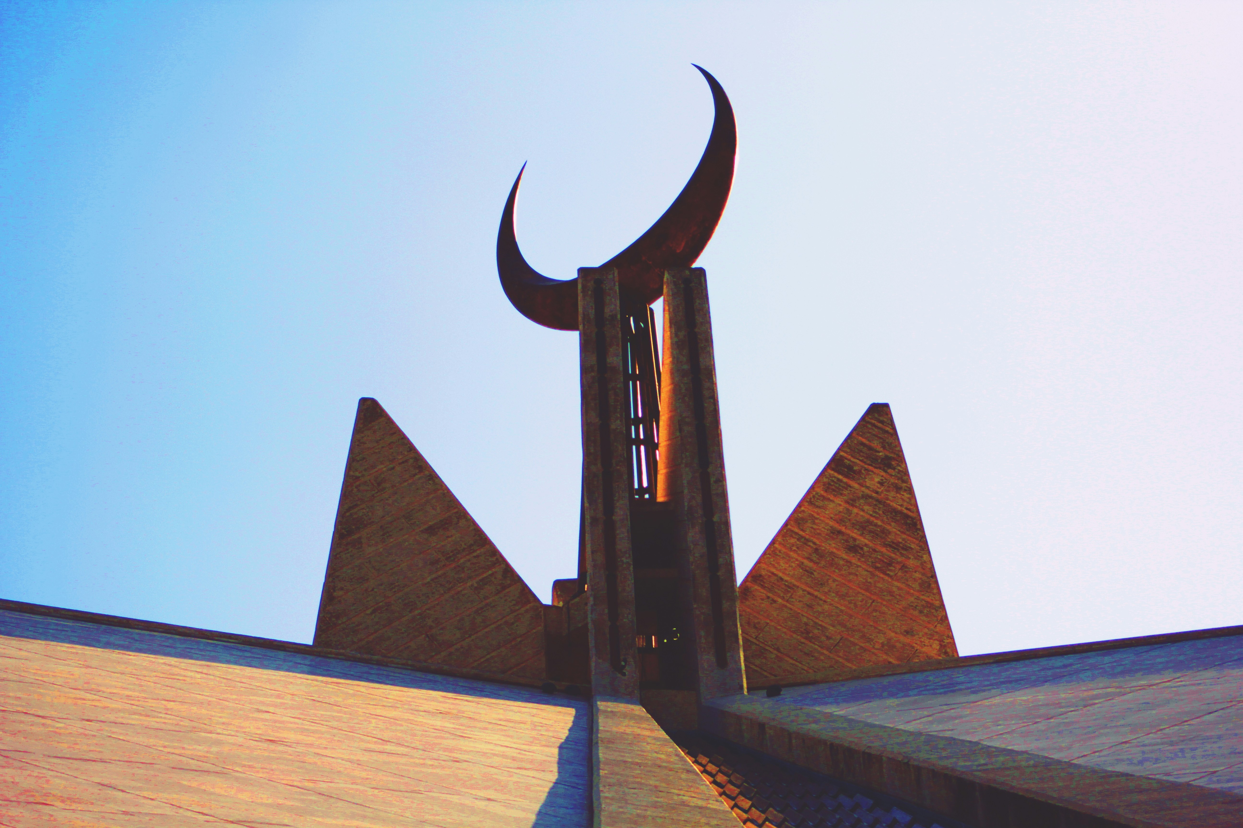 Faisal Mosque (Urdu: فیصل مسجد‎) is a mosque in Islamabad, Pakistan. It is located on the foothills of Margalla Hills in Islamabad. | brown building