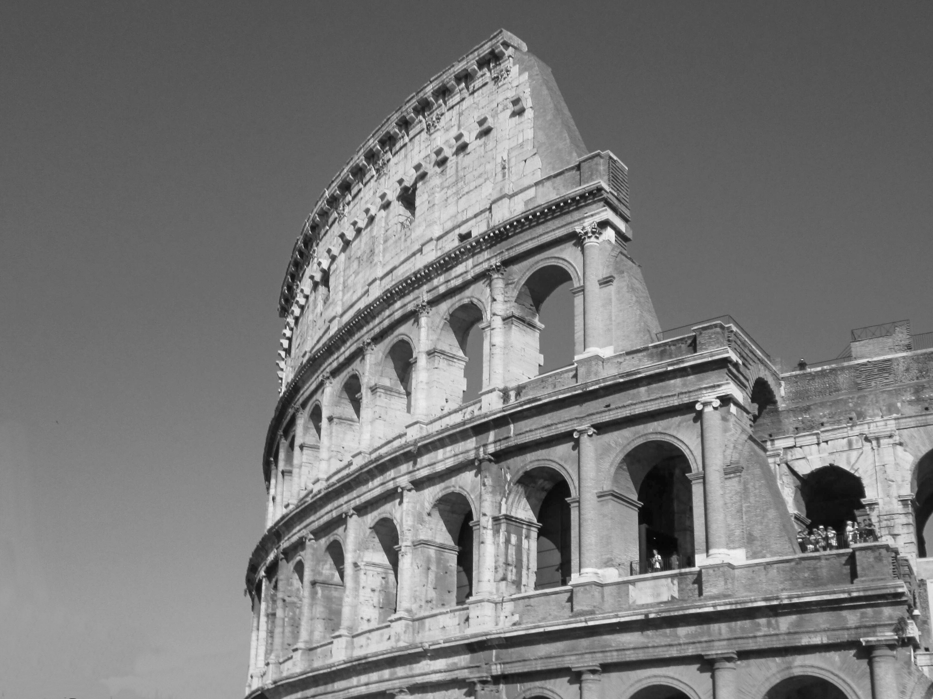 Colosseum in Monochrome: Arches Against a Clear Sky