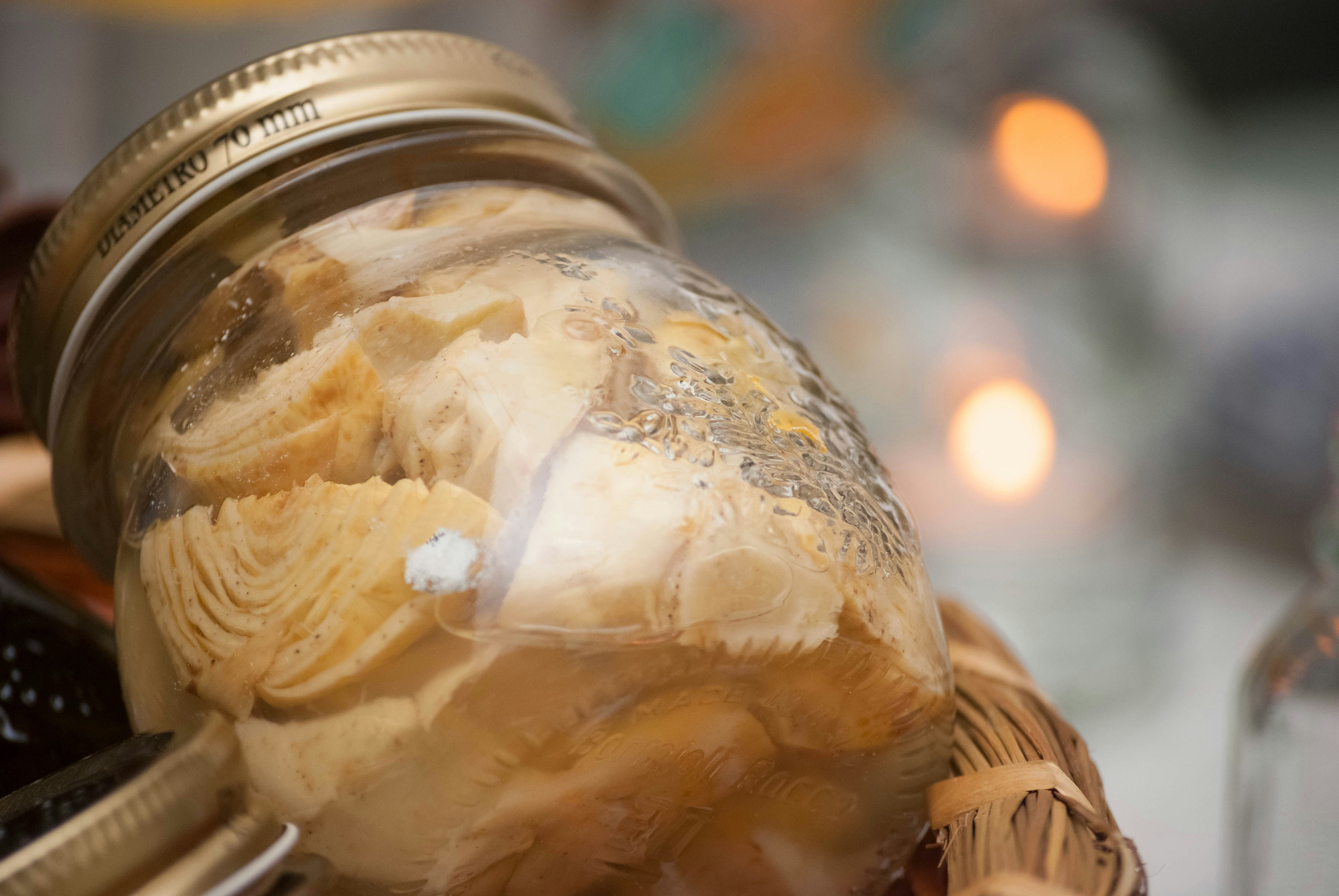 Tilting Mason Jar, Golden Cookies, and a Soft Kitchen Glow