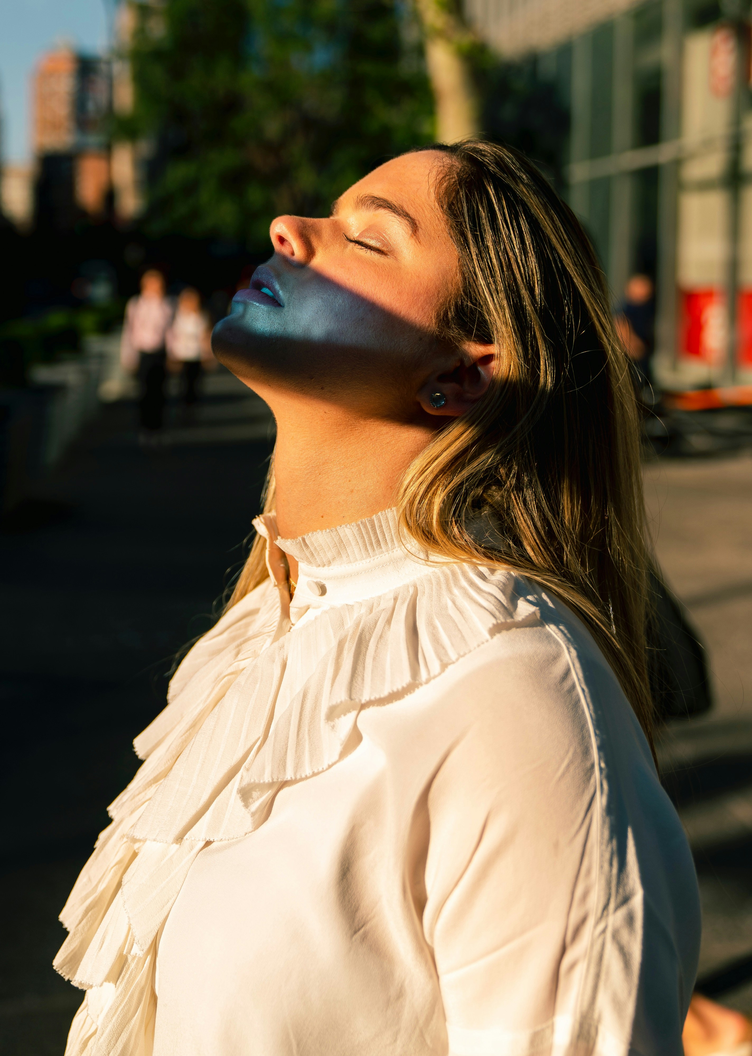 Sunlit Contemplation: Face Tilt and Quiet Confidence
