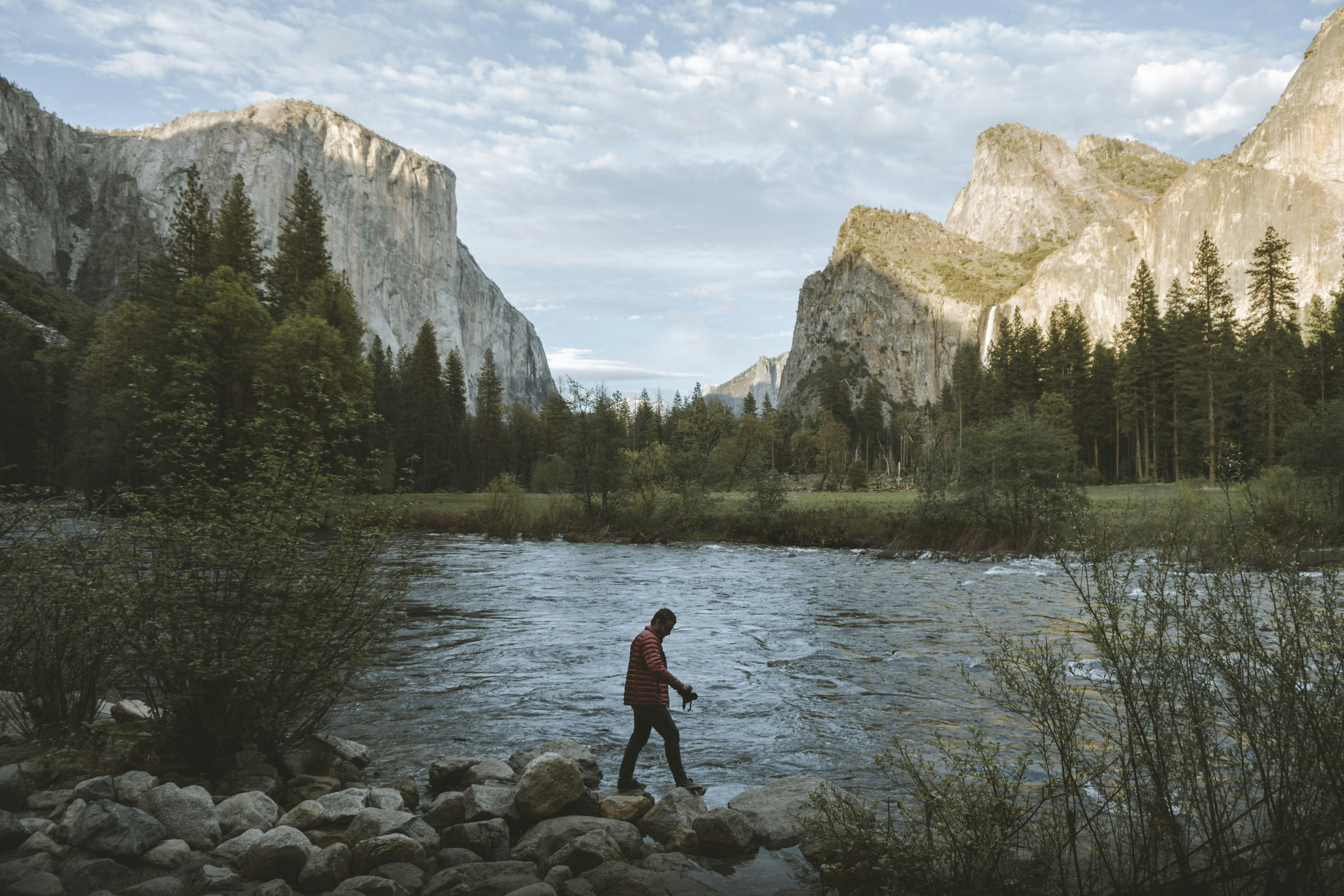 Woman walking near body of water photo – Free Grey Image on Unsplash
