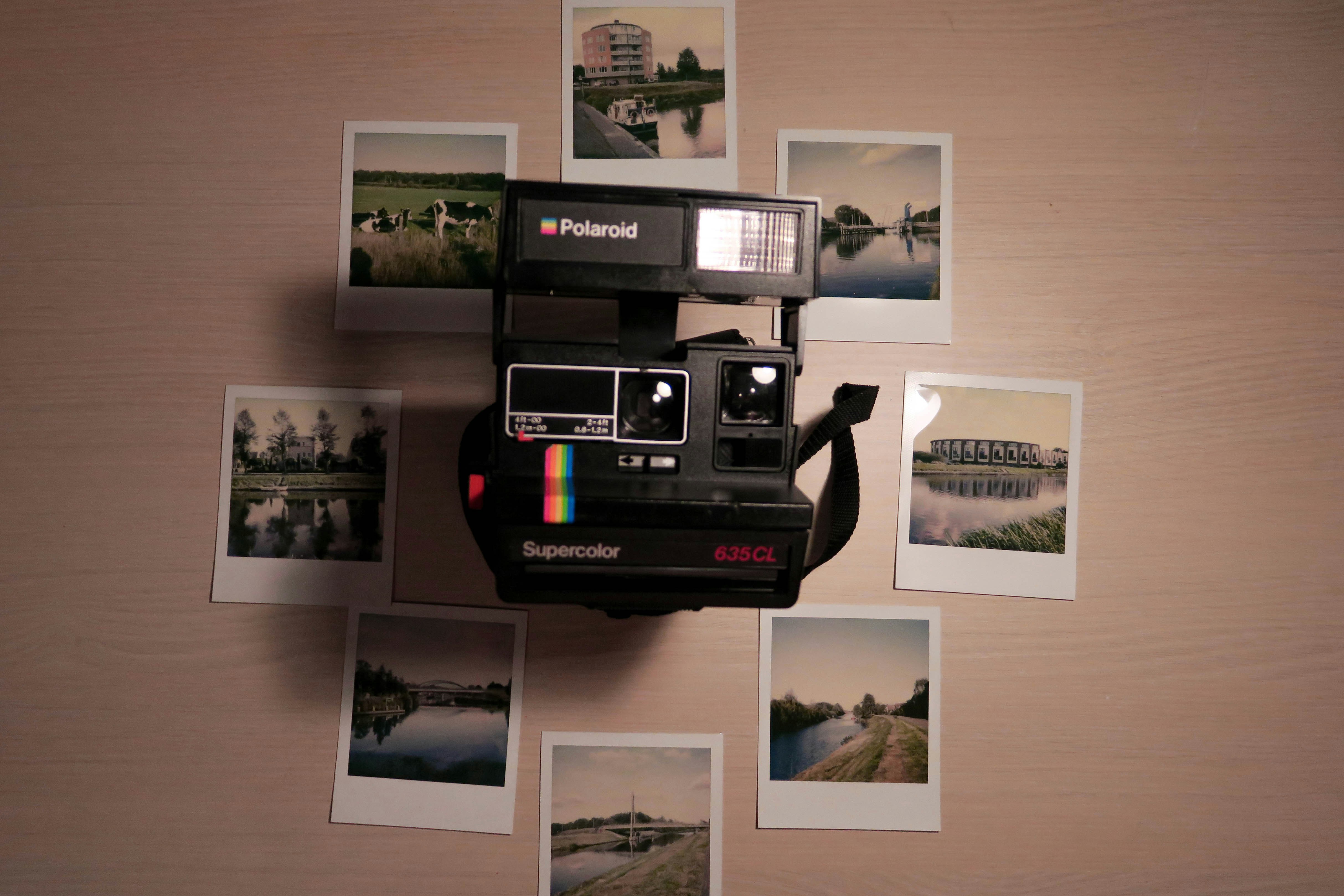 Polaroid 635 CL with photos