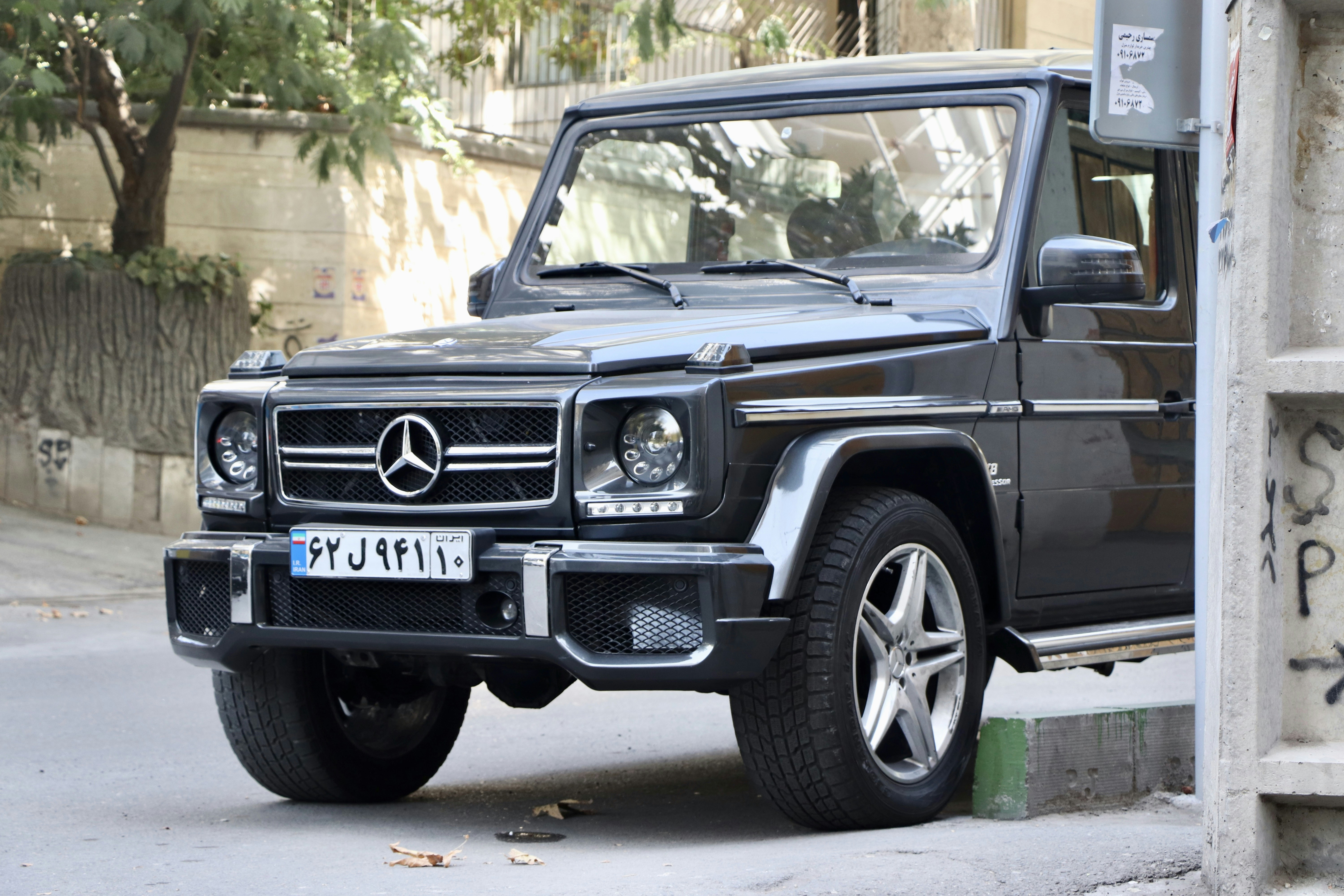Black Mercedes-Benz vehicle parked beside wall photo – Free Tajrish ...