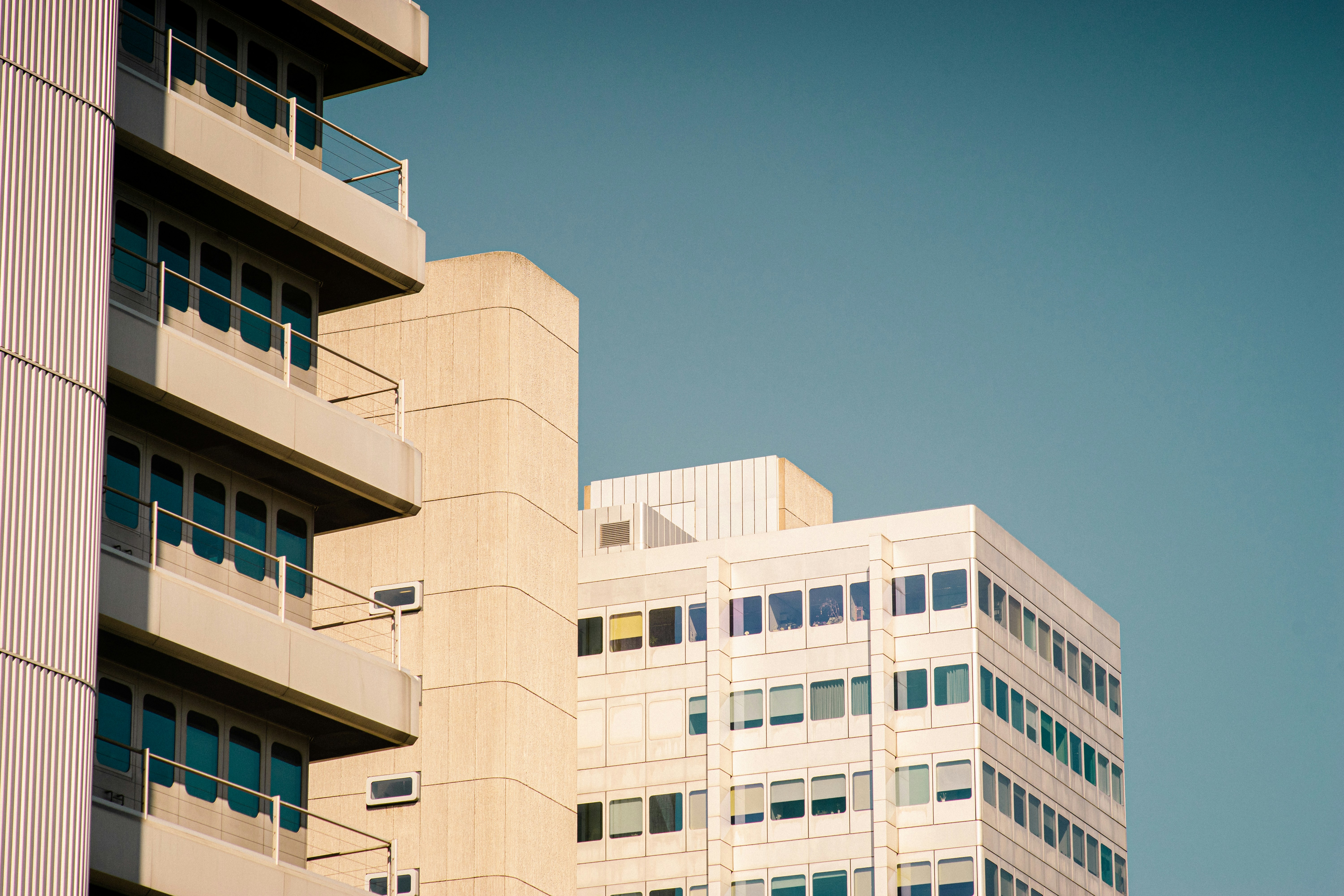 White concrete high-rise building during daytime photo – Free Building ...