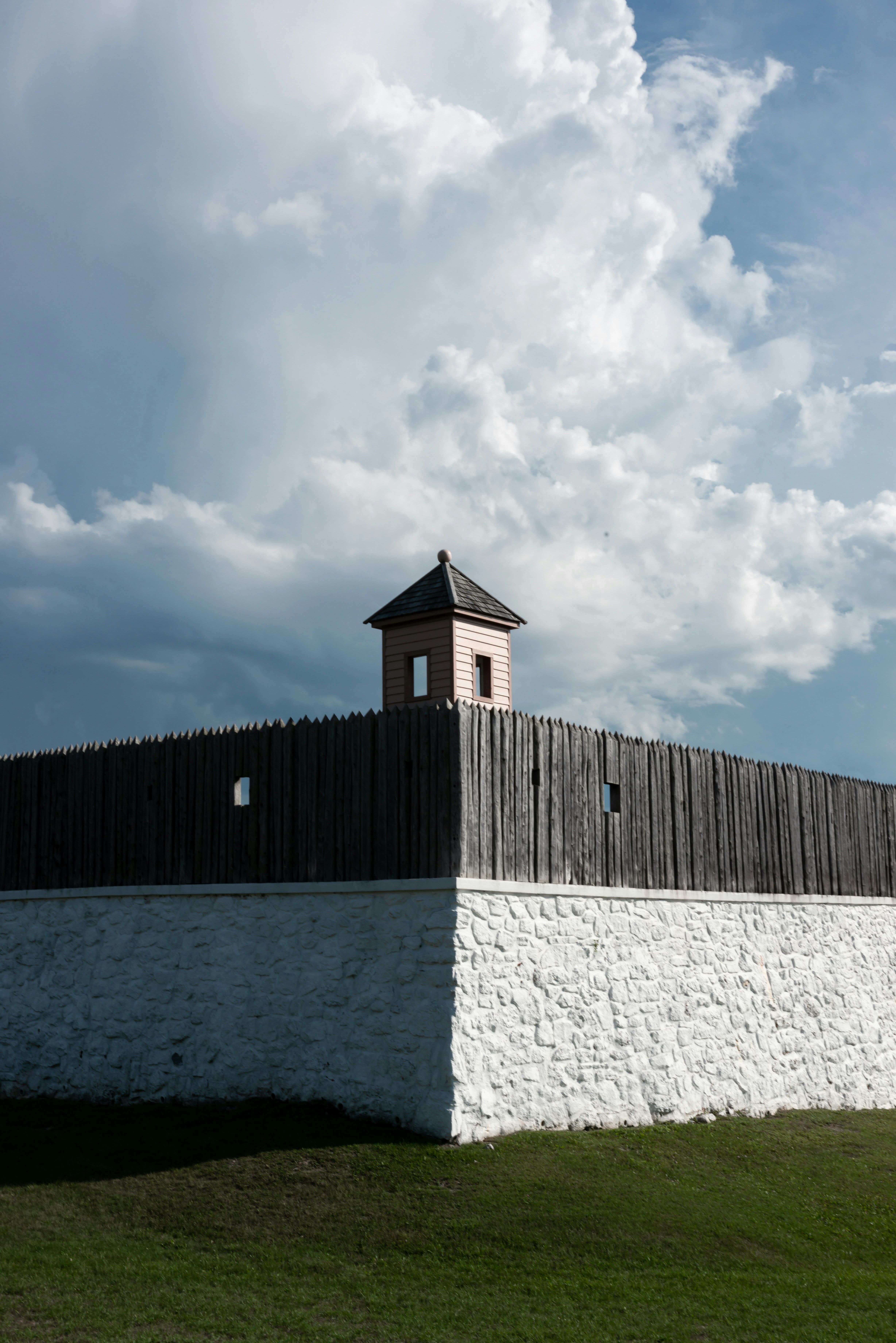 Timber Watchtower Rising Above a White Bastion