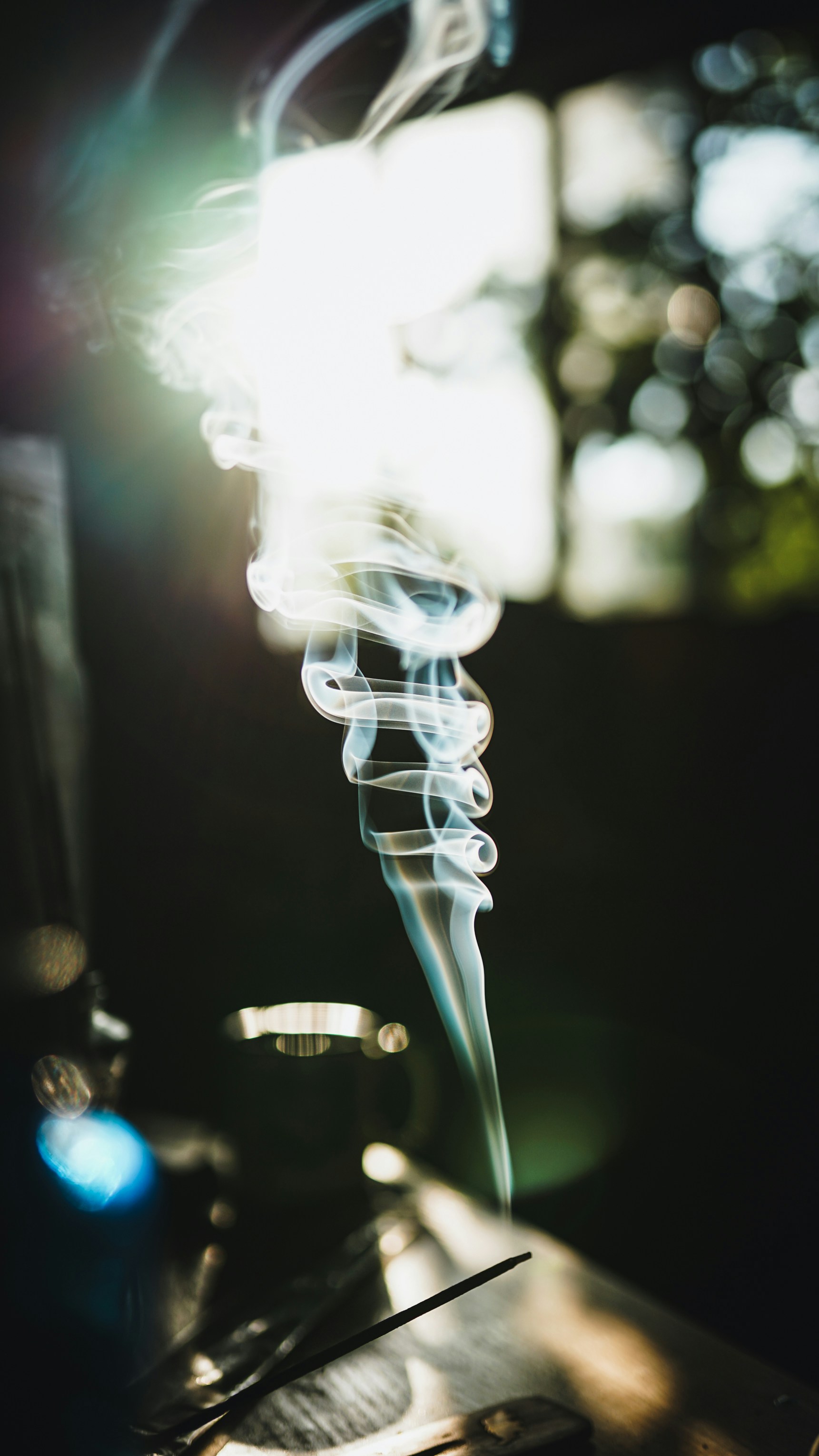 the smoke is coming out of the top of a pipe