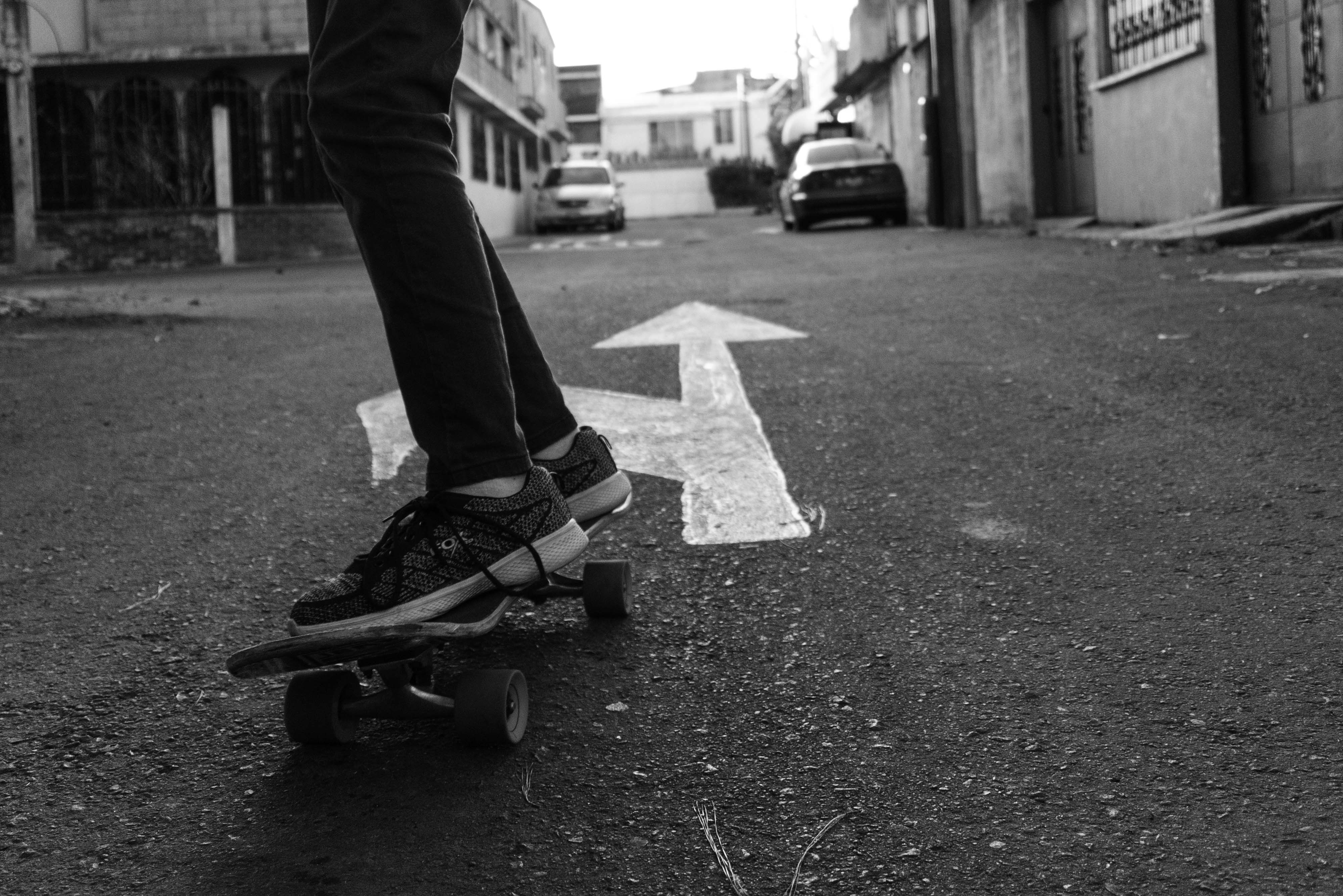Grayscale photography of person skateboarding on pathway photo – Free ...