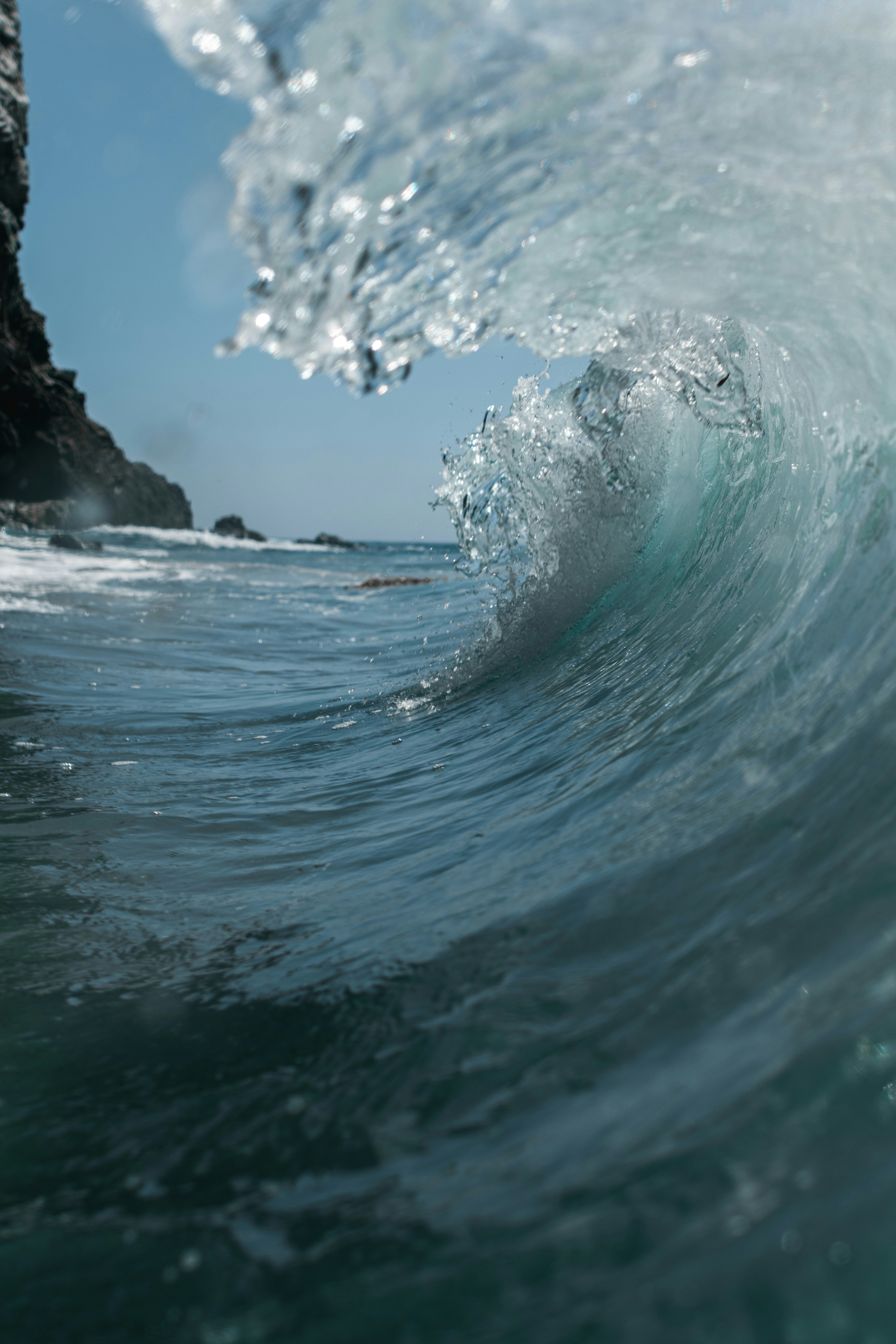 A large wave is coming towards the shore photo – Free Grey Image on ...